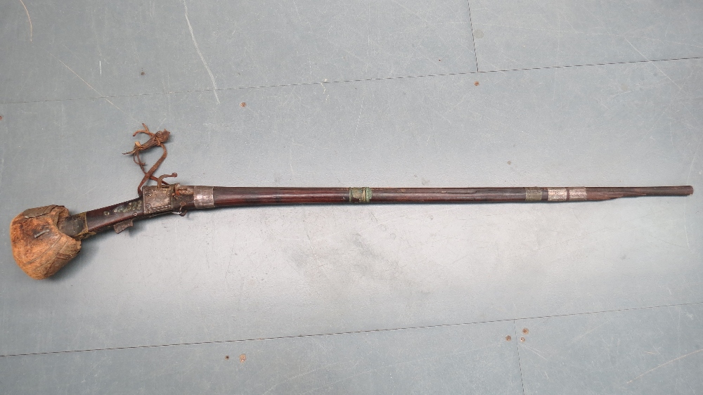 An Arabic matchlock musket (Jezail with a 117.5cm iron barrel of about ...