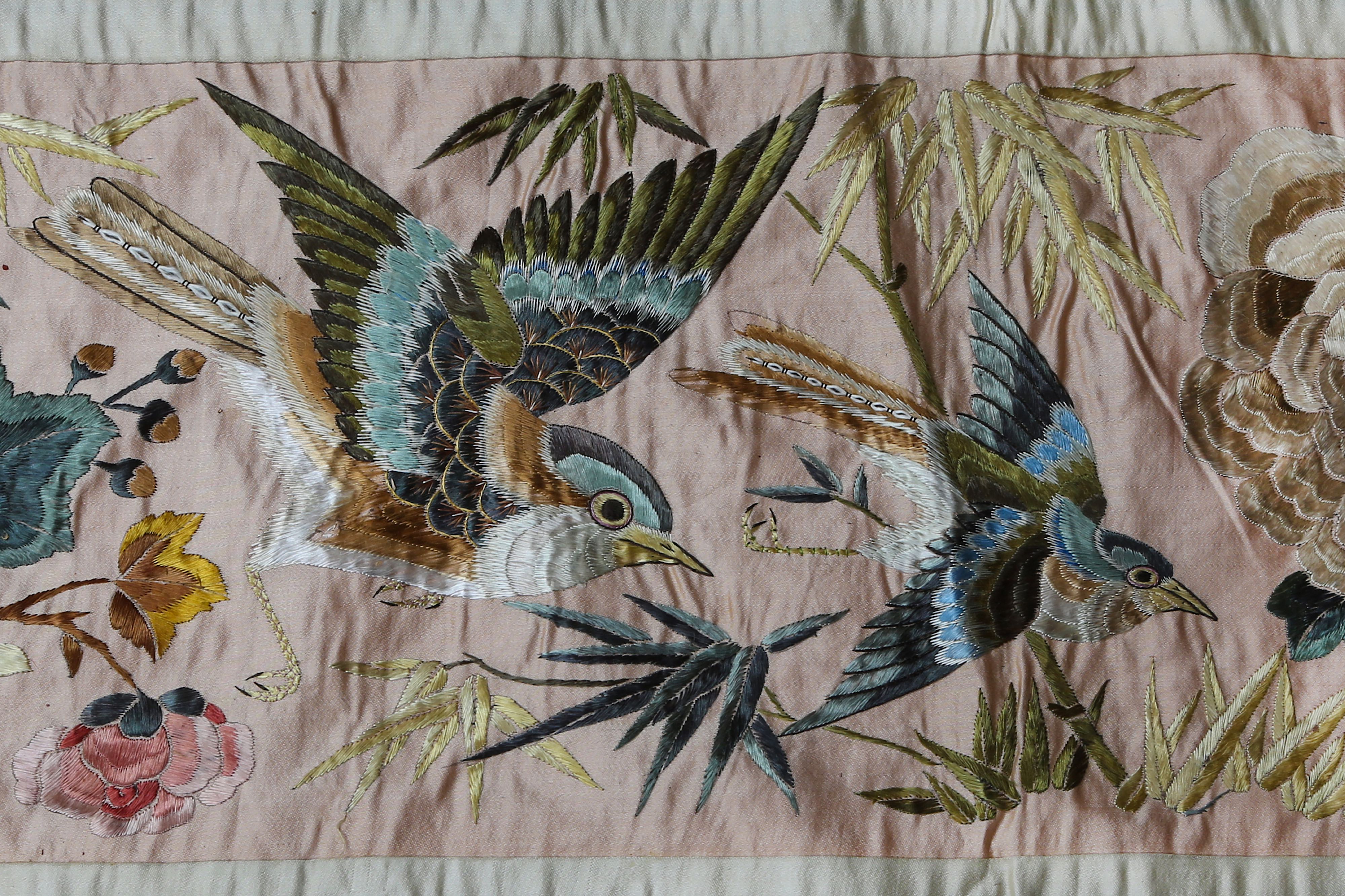 A CHINESE EMBROIDERED 'BIRDS AND FLOWERS' SILK PANEL. Qing Dynasty ...