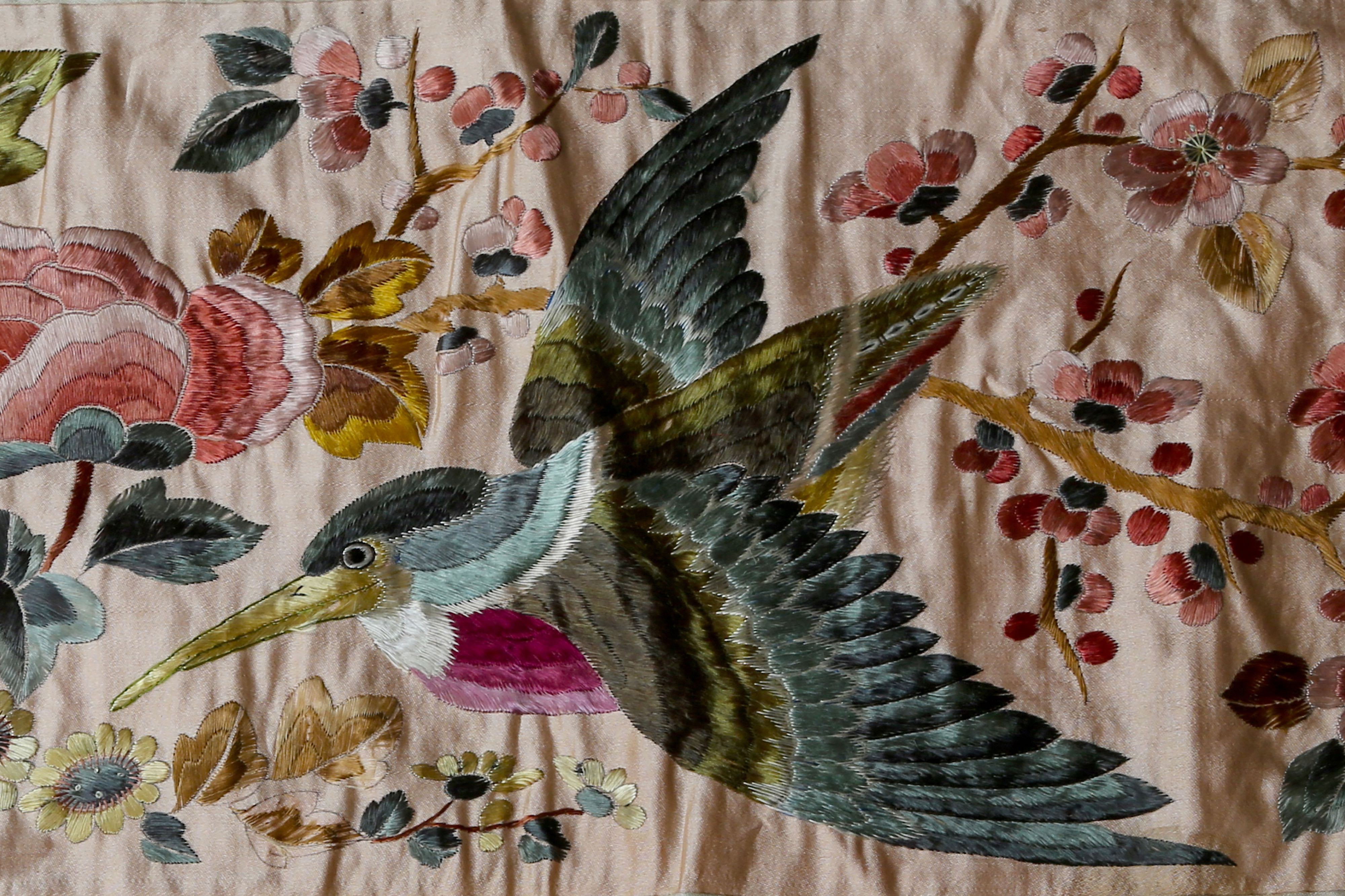 A CHINESE EMBROIDERED 'BIRDS AND FLOWERS' SILK PANEL. Qing Dynasty ...