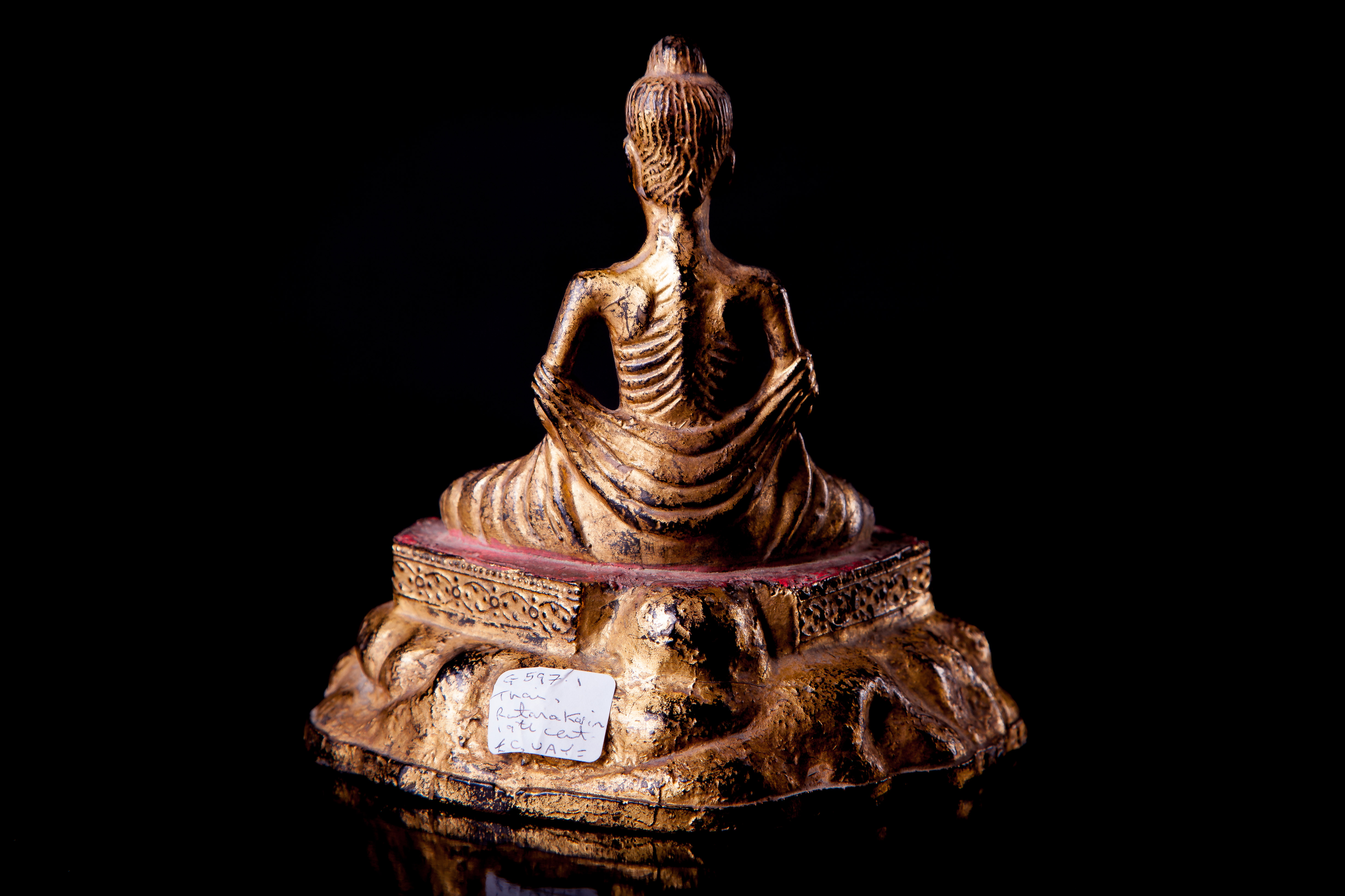 Two gilded and lacquered bronze fasting Buddha. A seated Fasting Buddha ...