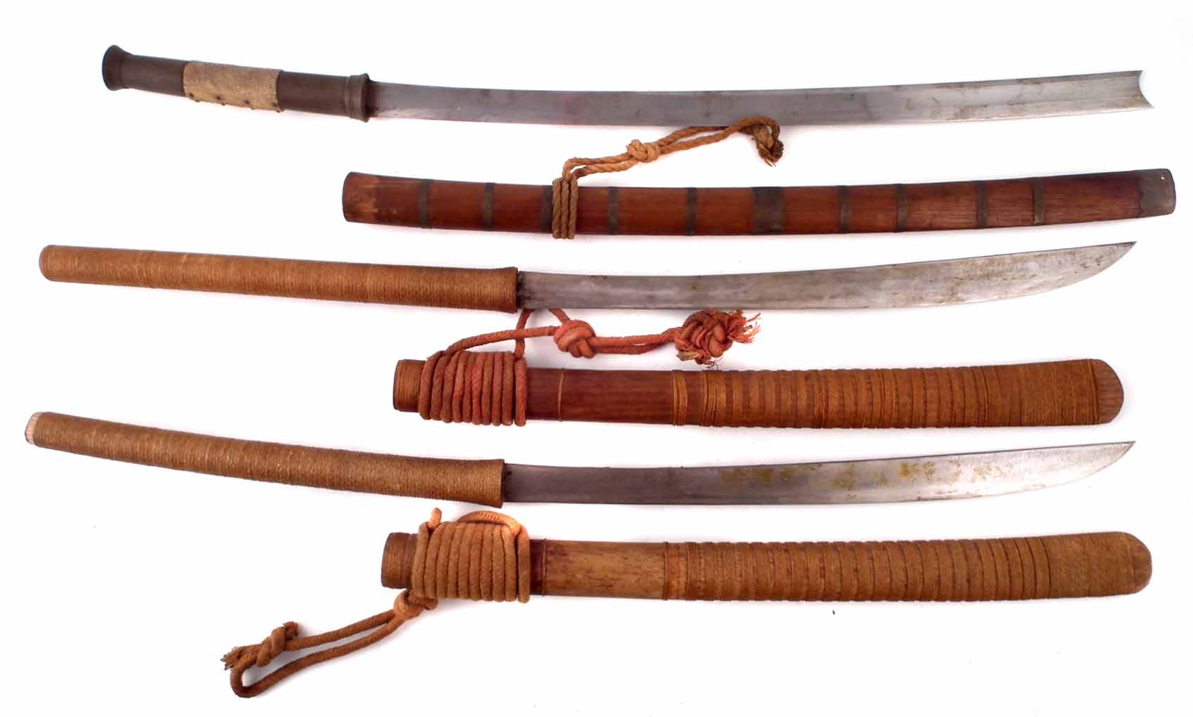 Two Burmese Dha/Dao and a Kachin Dha sword, with wood fittings bound in ...