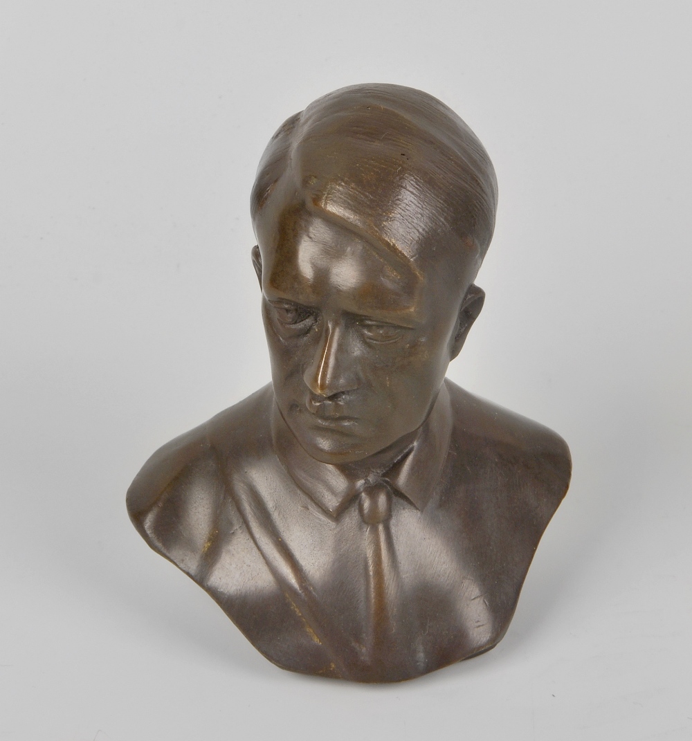 A small bronzed bust depicting Adolf Hitler, 4.75 (12cm) high. Some ...