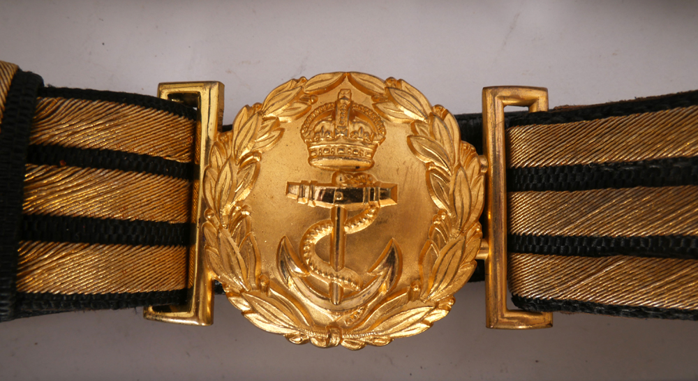 Military uniform belts. A collection of levee and parade uniform belts ...