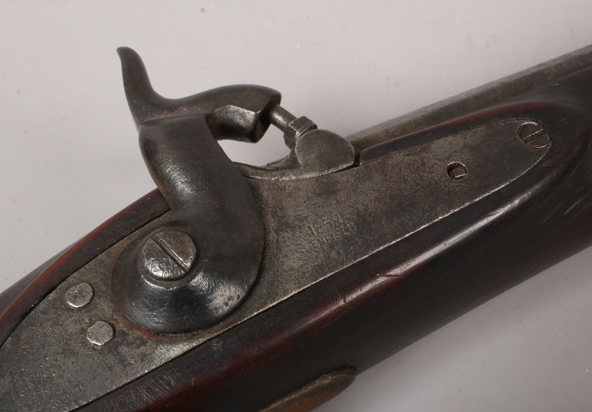 A 19th century percussion cap pistol with walnut fullstock, lock plate ...