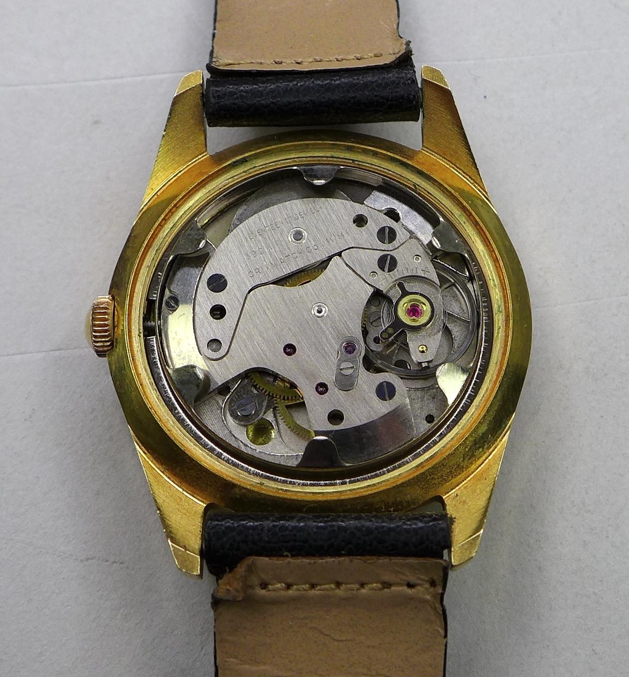 A vintage Oris gold plated gentleman's wristwatch, circular black dial ...