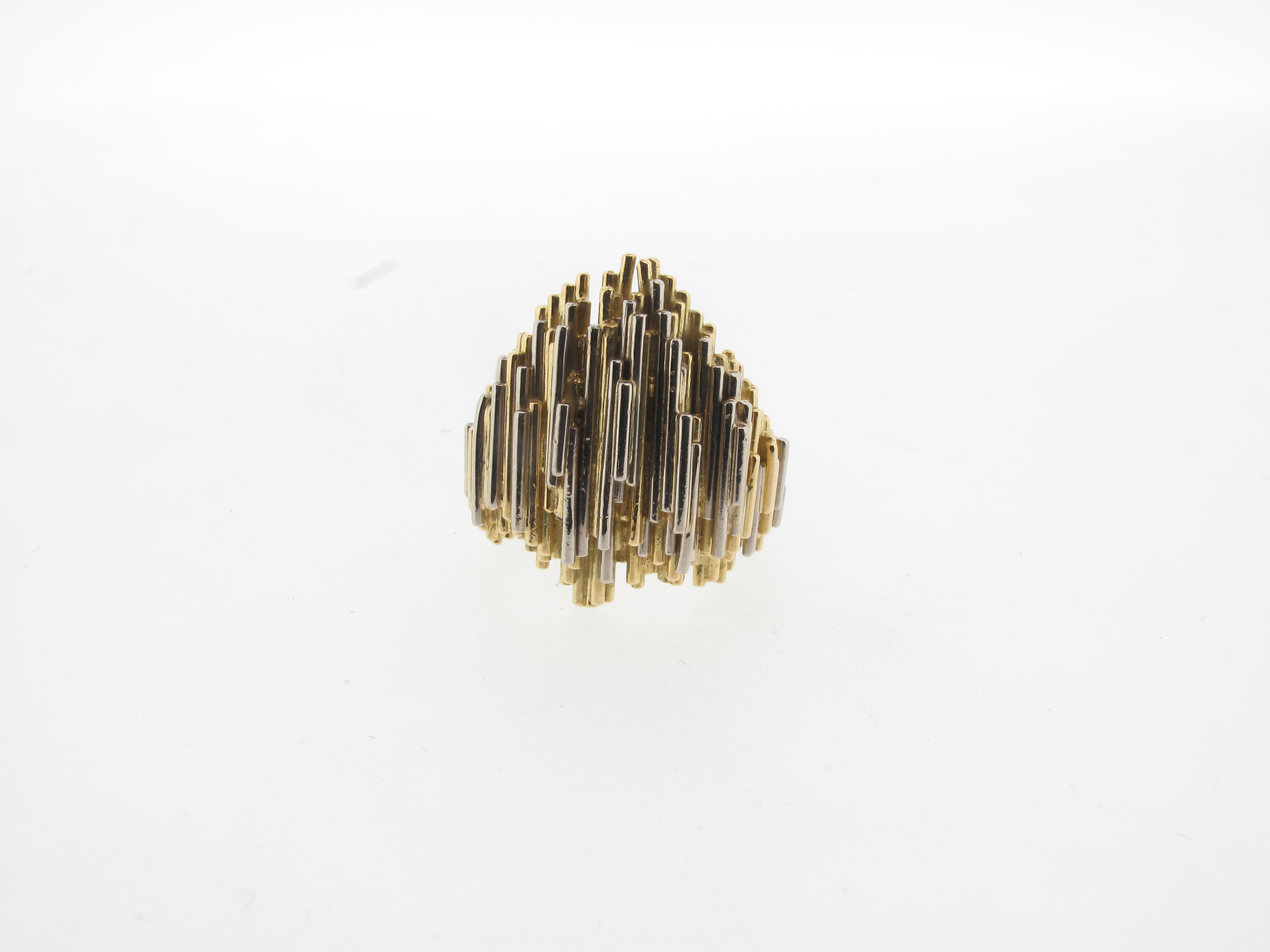 An abstract 18ct gold ring by Charles de Temple, formed from layers of ...