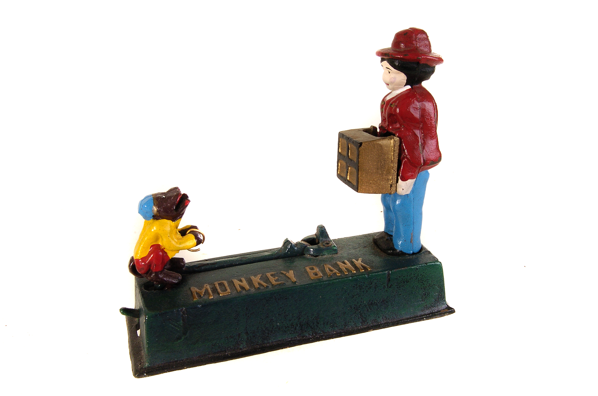 A vintage cast iron money box, entitled 'Monkey Bank'