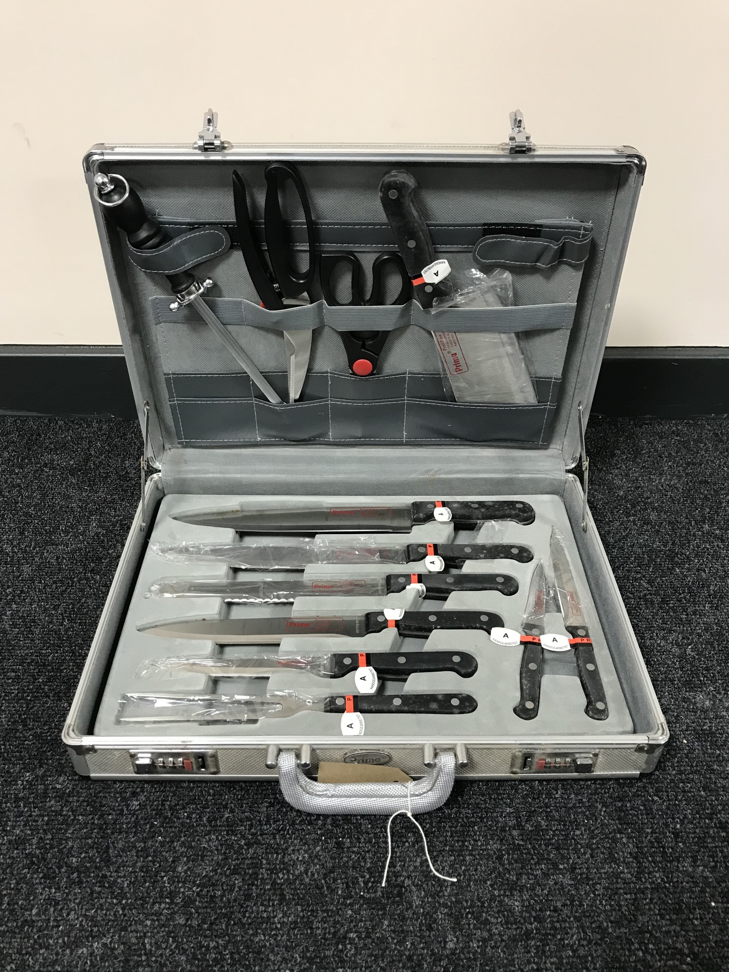 A cased Prima chef's knife set