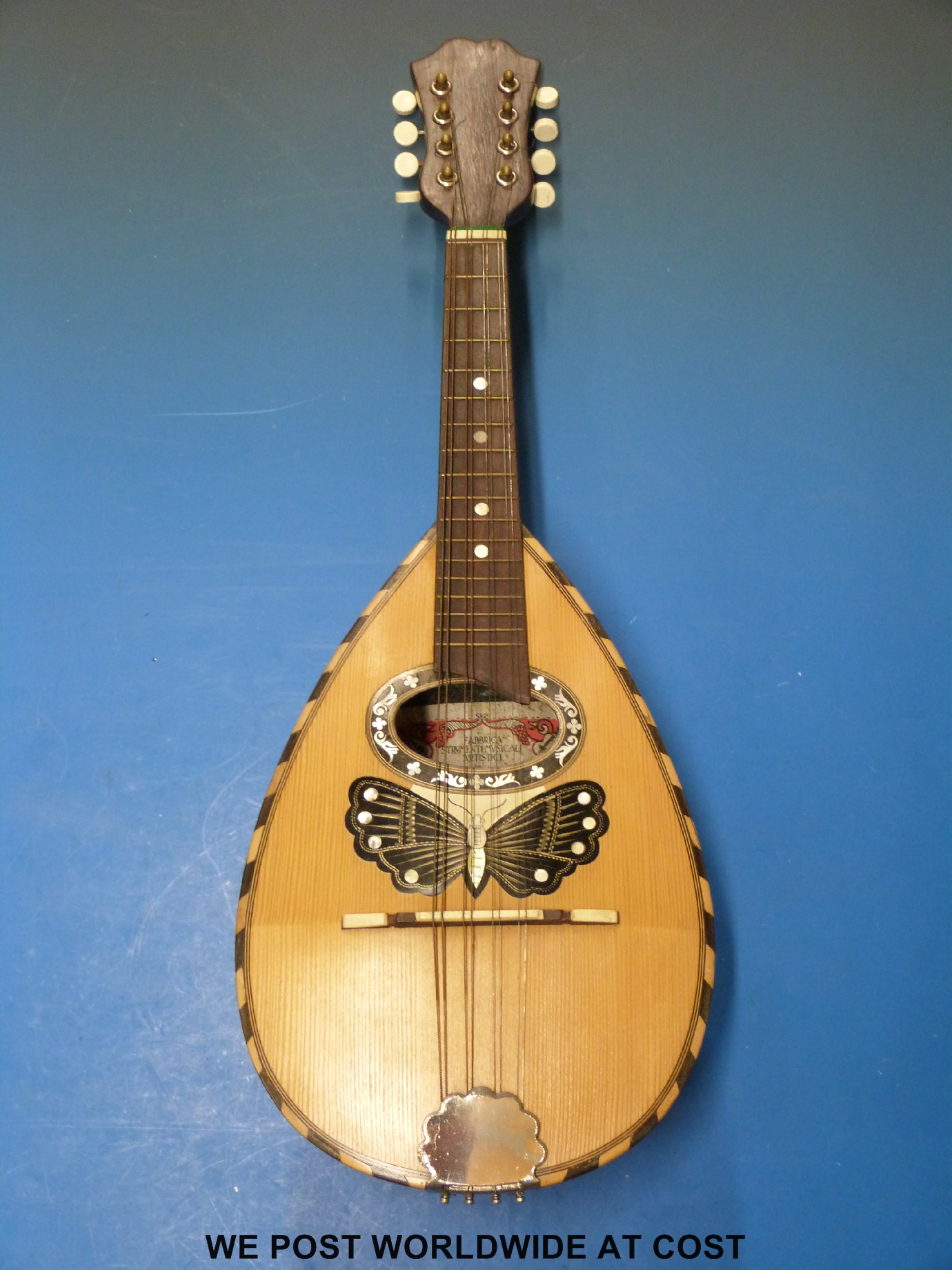 A cased c1920 Ermelinda Silvestri Catania mandolin decorated with ...
