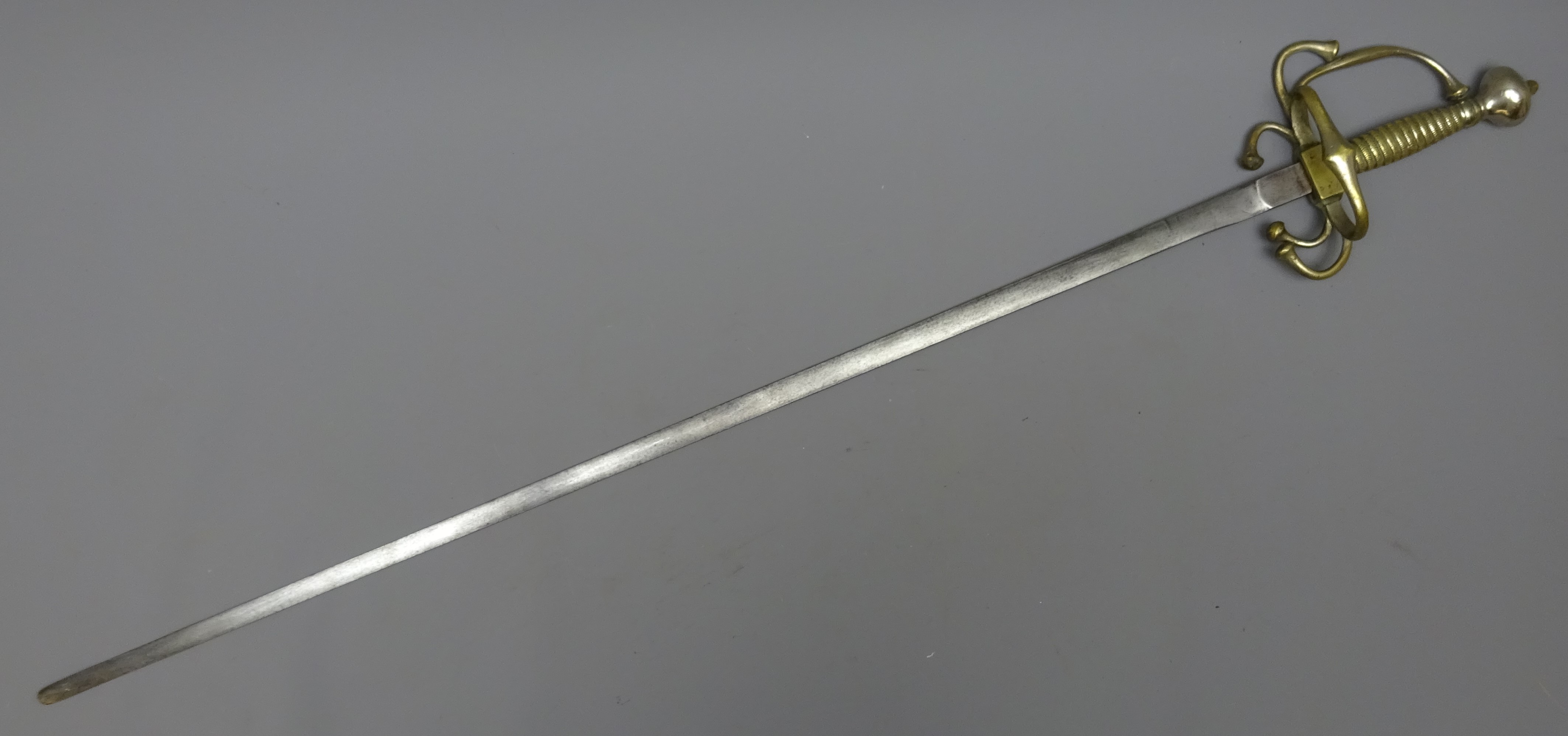18th century French rapier, the 80.5cm steel blade inscribed Coulaux & Co Klingenthal, cast brass