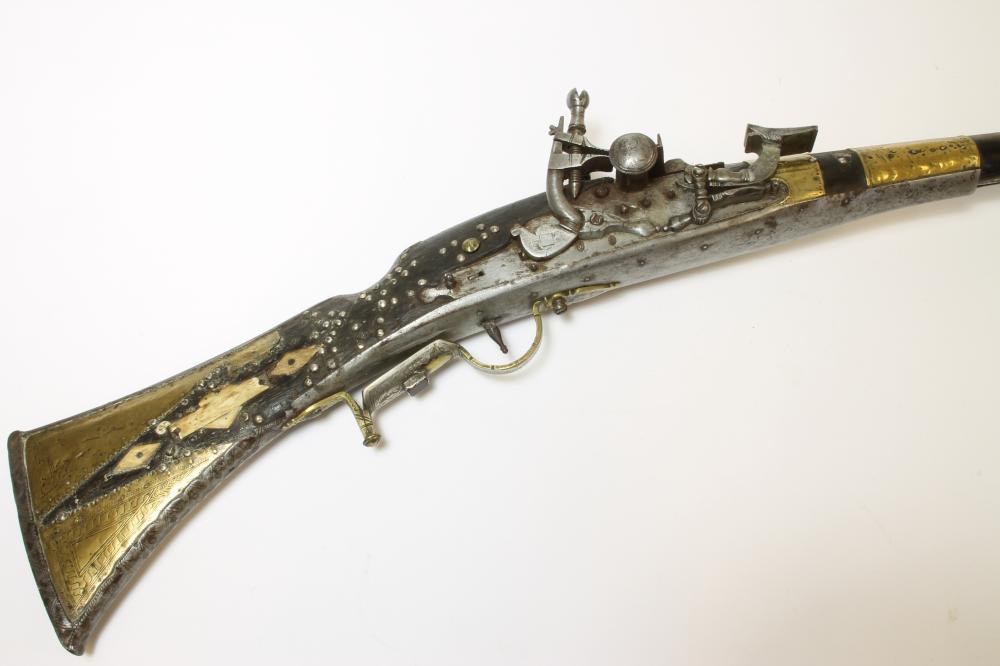 A NORTH AFRICAN SNAPHAUNCE MUSKET, 19th century, the 46" octagonal ...