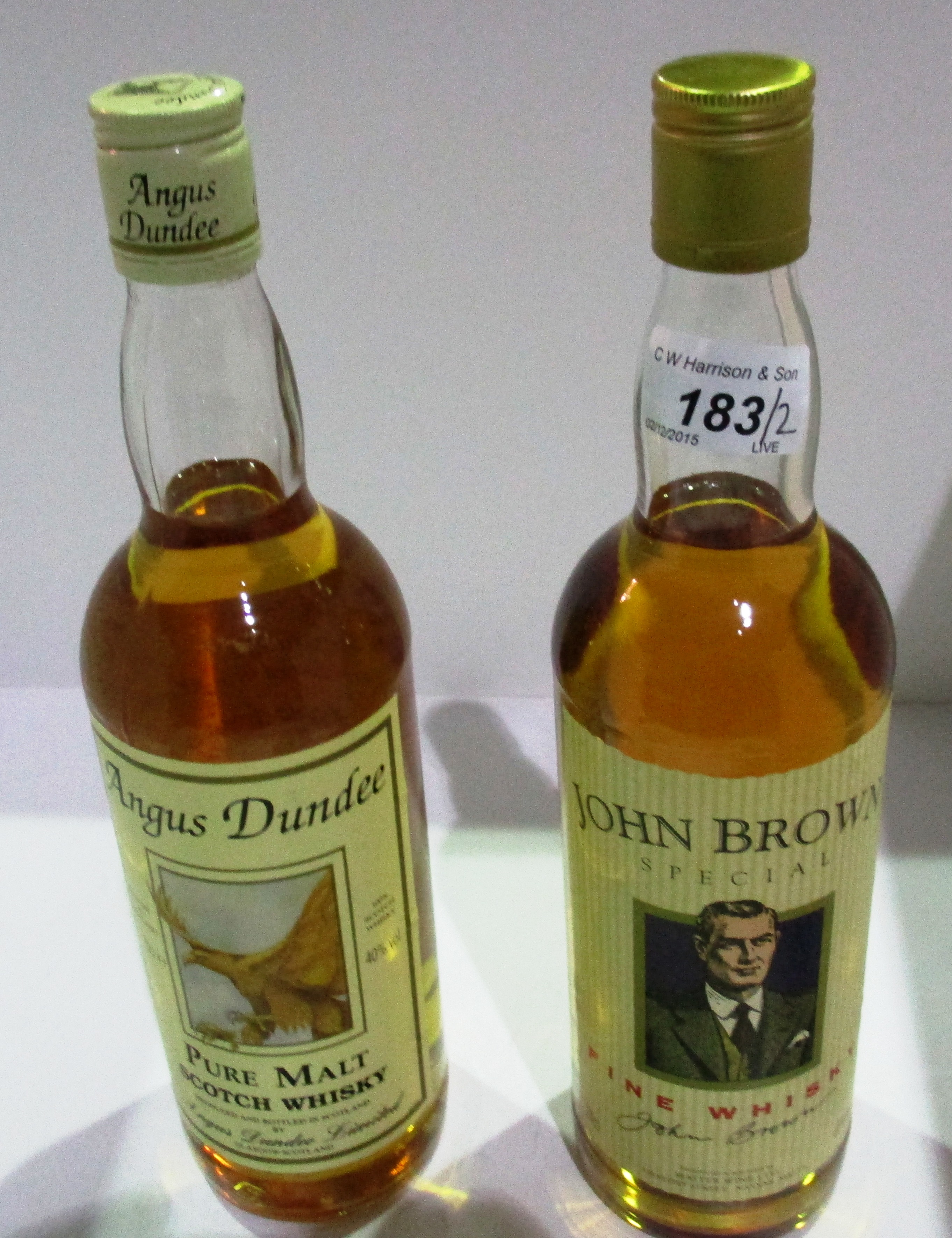 A 70cl bottle of Angus Dundee pure malt scotch whisky and a 70cl bottle ...