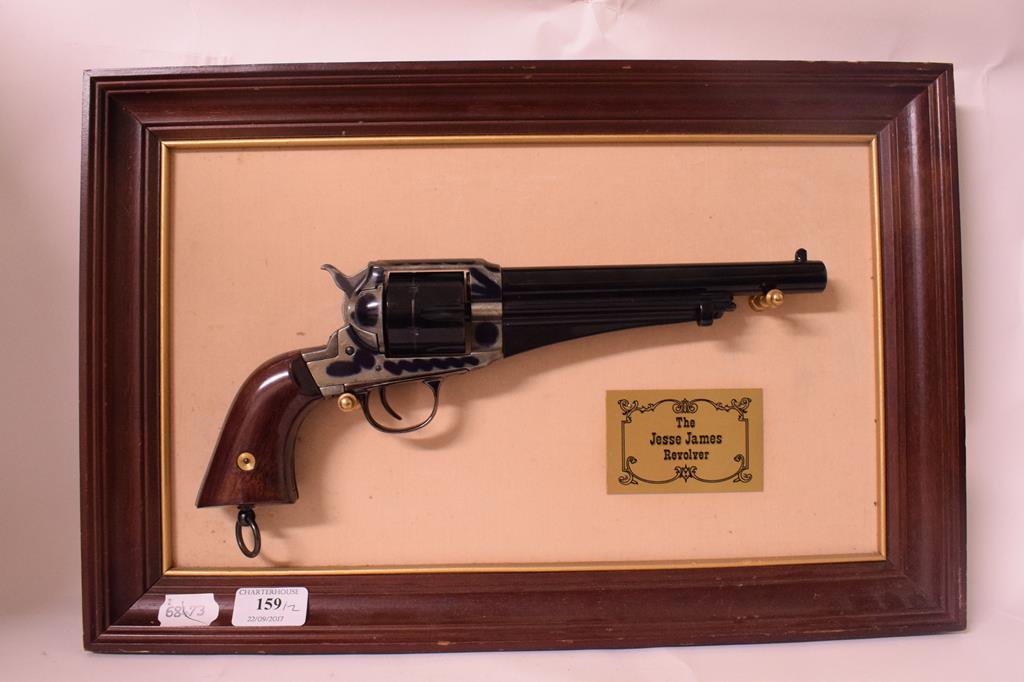 The Jesse James replica revolver, and the John Wayne Armed Forces ...