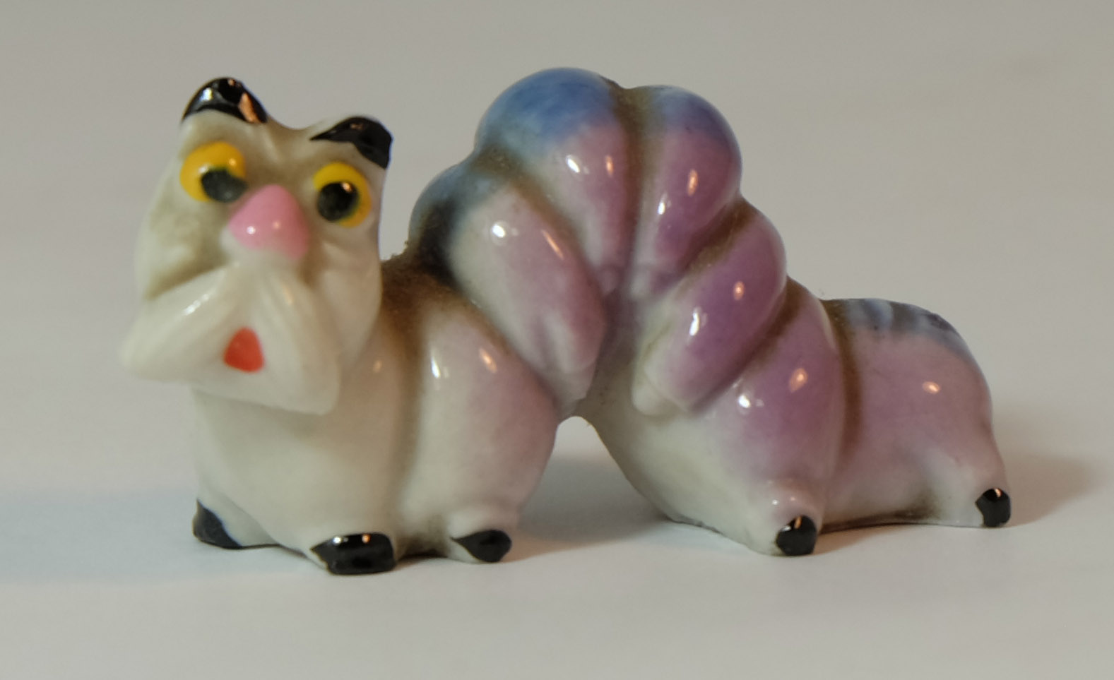 Wade figure Merlin as a caterpillar from the Walt Disney Sword in the ...