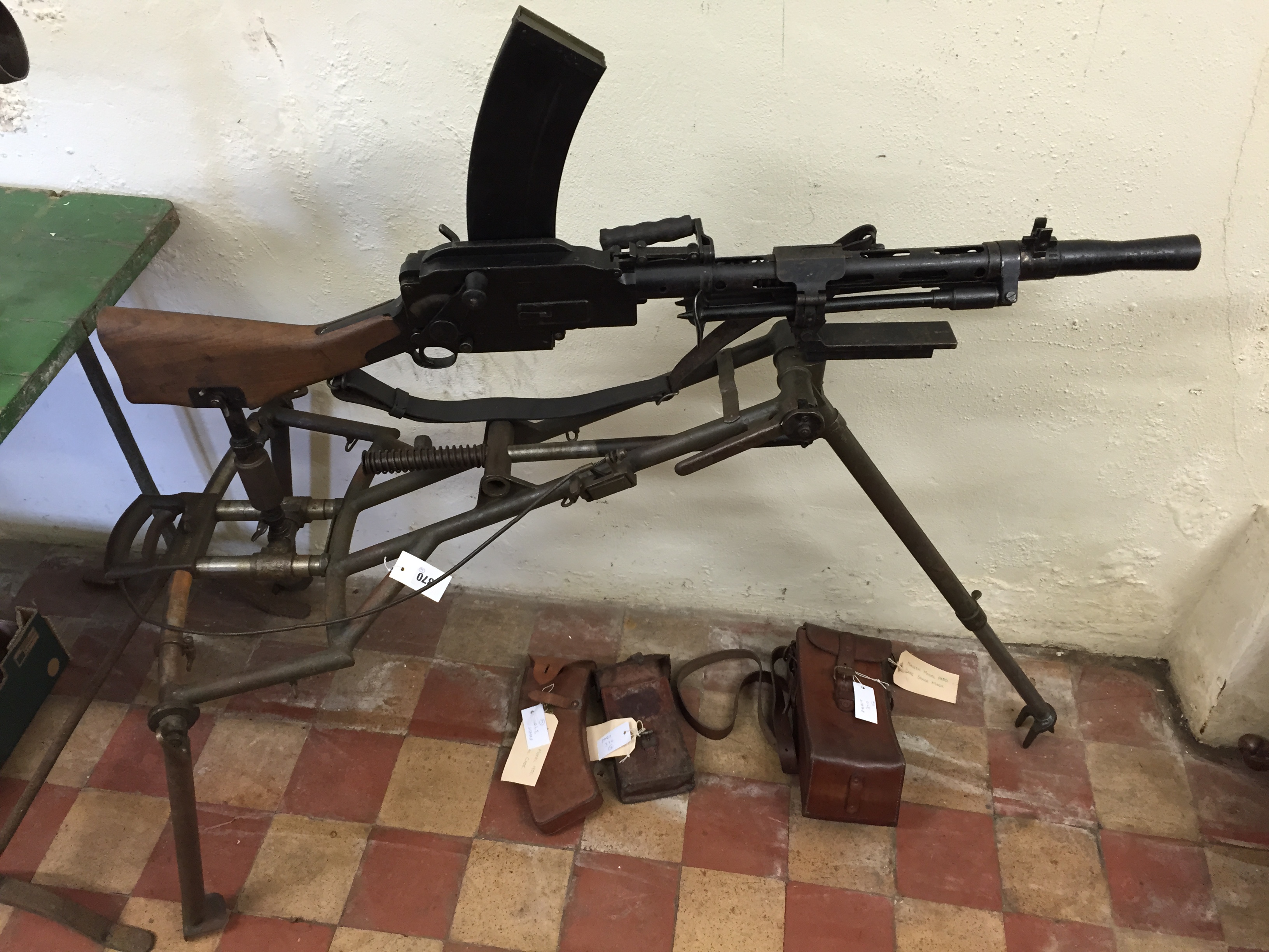 A Madsen 7.92mm light machine gun, number 2237, on an adjustable tripod ...