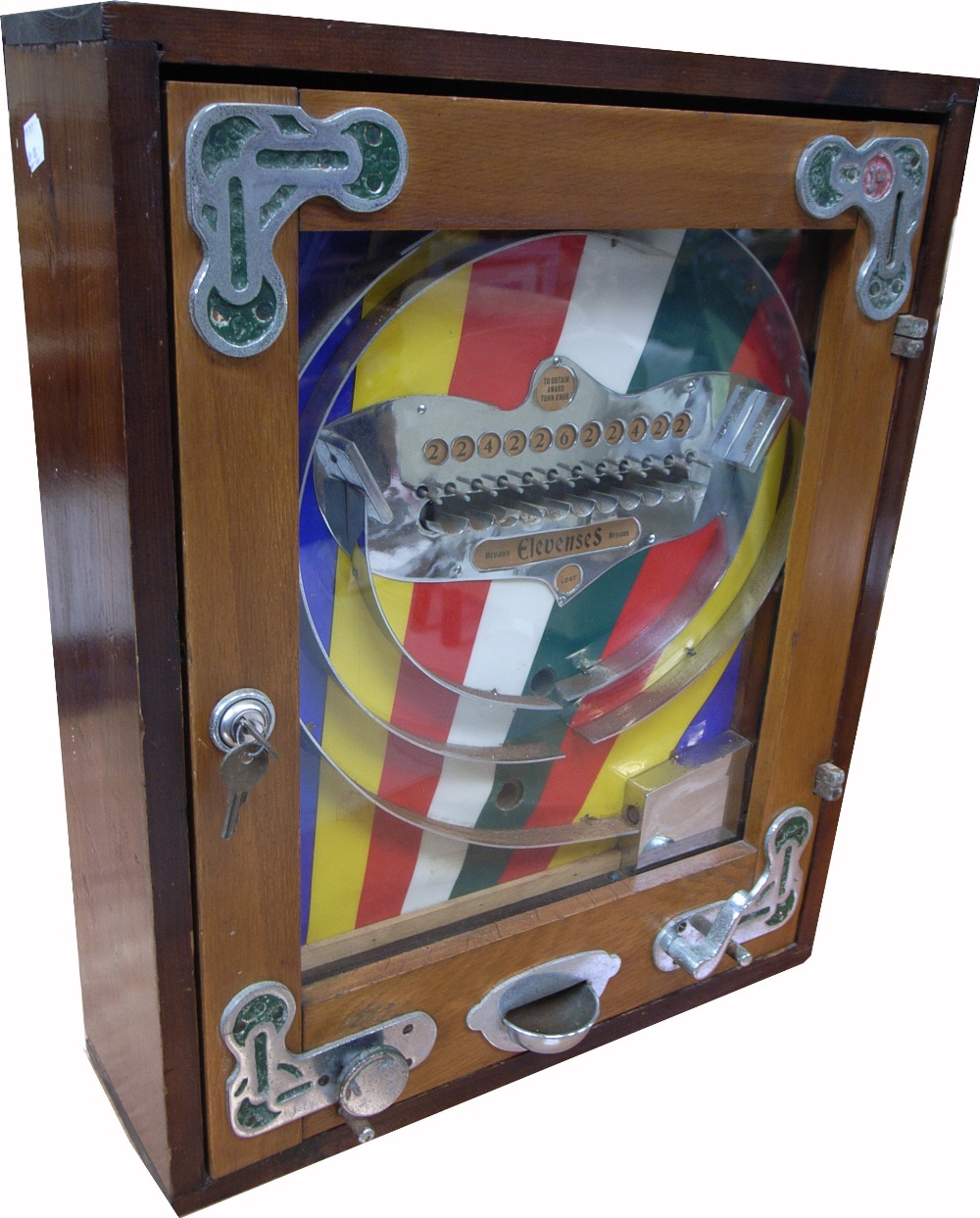 A Bryans "Elevenses" wall mounted bagatelle type slot machine game in ...