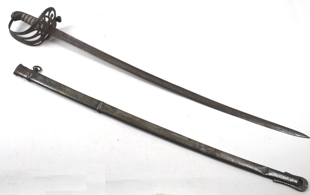 An early 19th century sword, with proof mark to the blade, the hilt ...