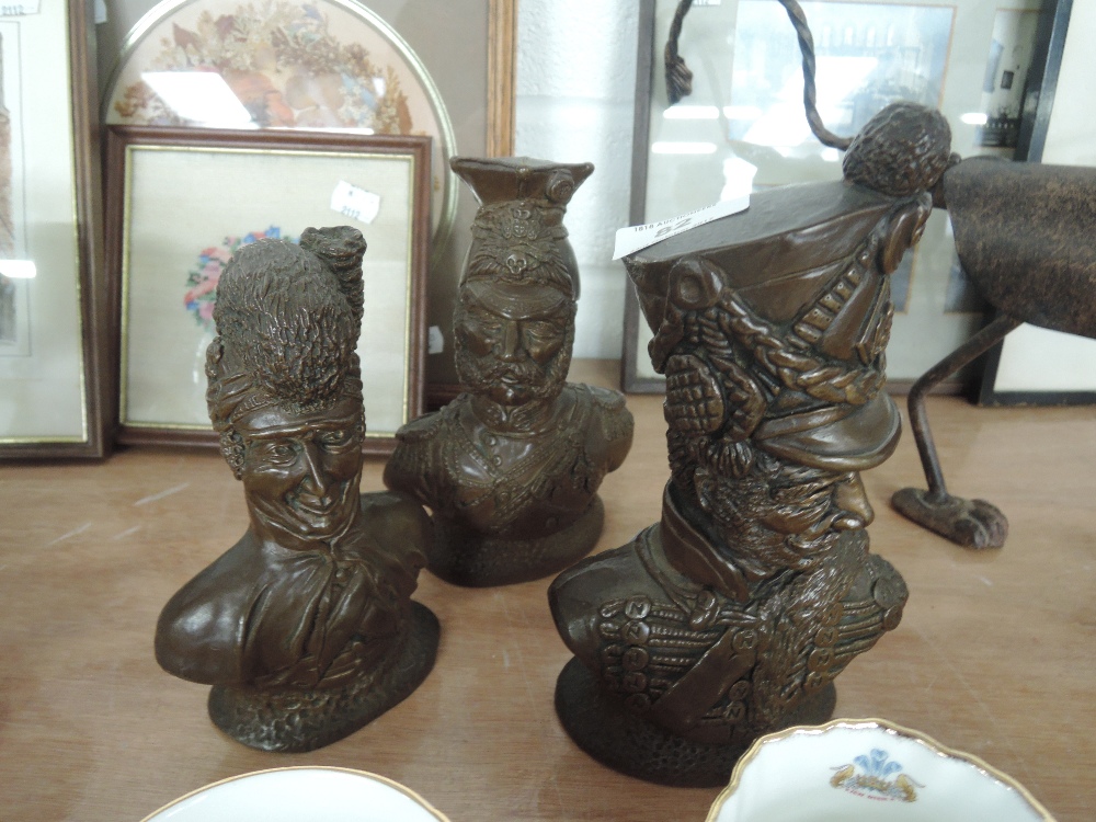 Three resin busts.