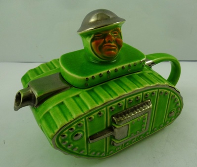 A SADLER POTTERY "CHURCHILL" WORLD WAR I TANK TEAPOT, with "Old Bill ...