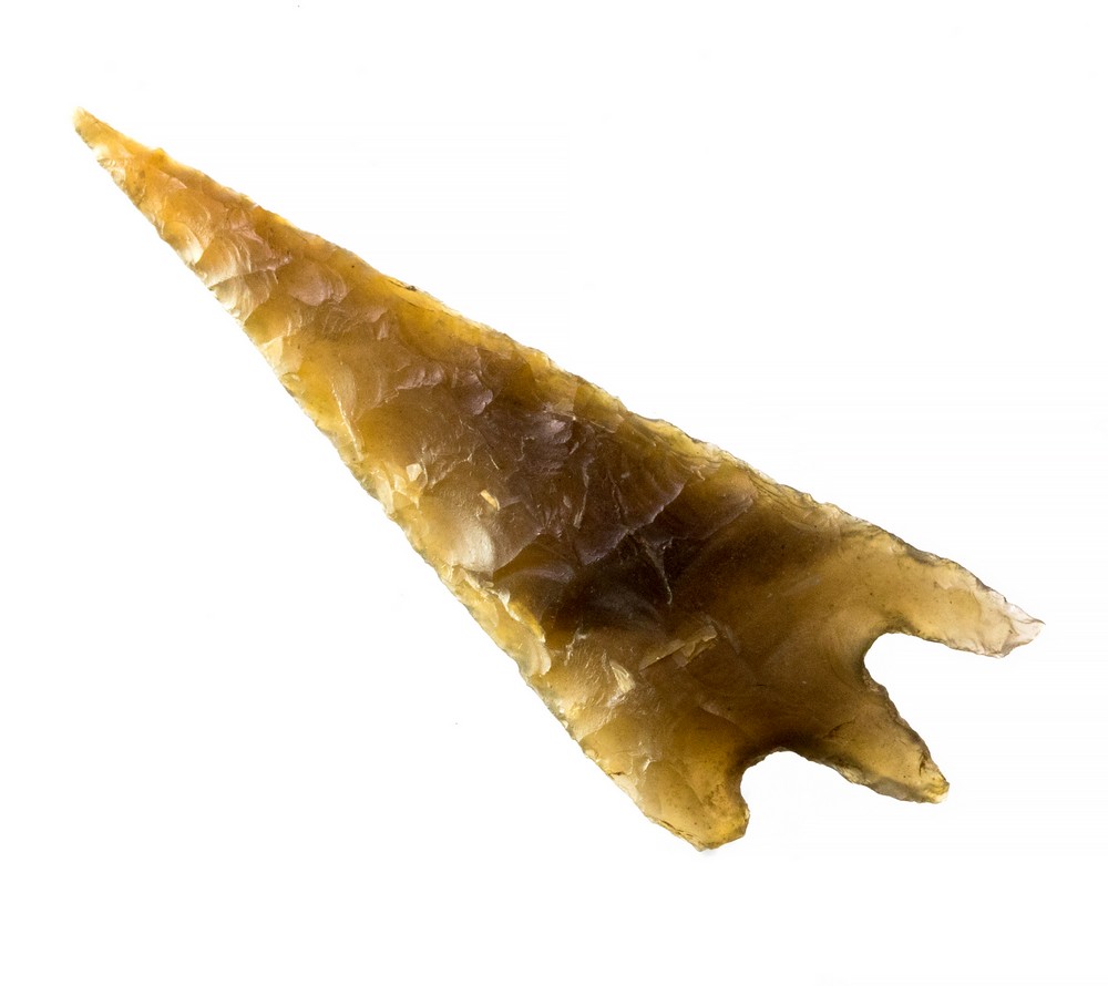 Barbed and Tanged Flint Arrowhead.A sub-triangular flint arrowhead with ...