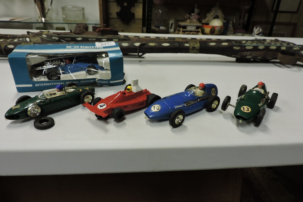 A collection of 1960's Scalextric, to include cars, in a wooden box