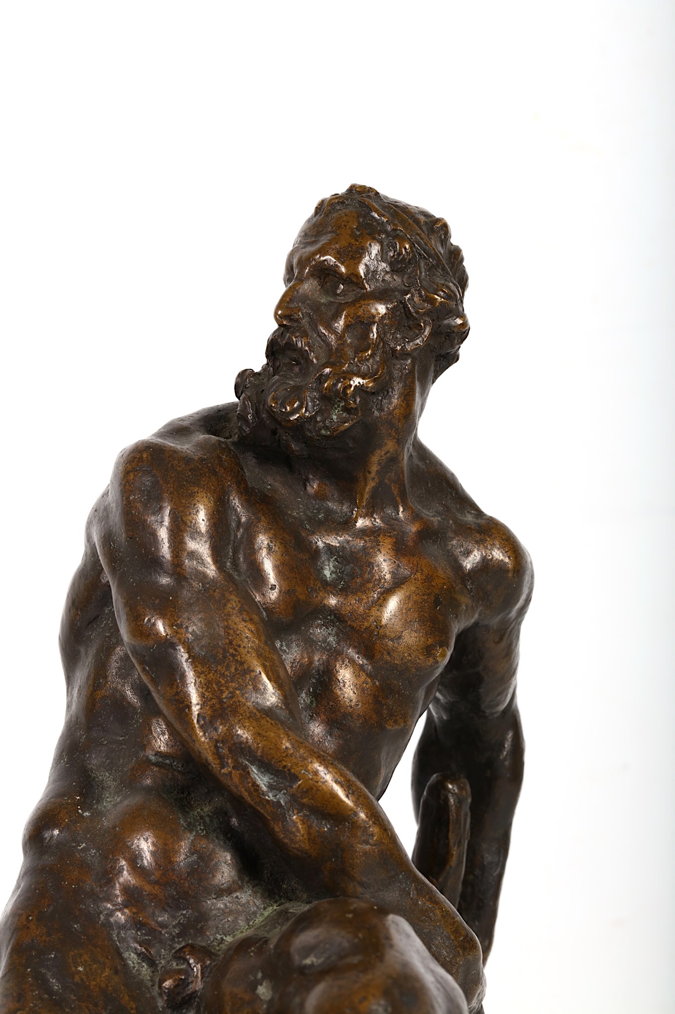 A 16TH CENTURY STYLE BRONZE FIGURE OF HERCULES RESTING IN THE MANNER OF ...