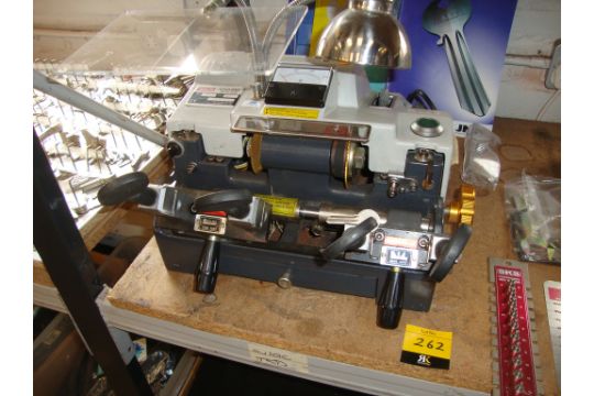 SKS Cyclone model 101B key cutting machine plus vast quantity of blanks ...