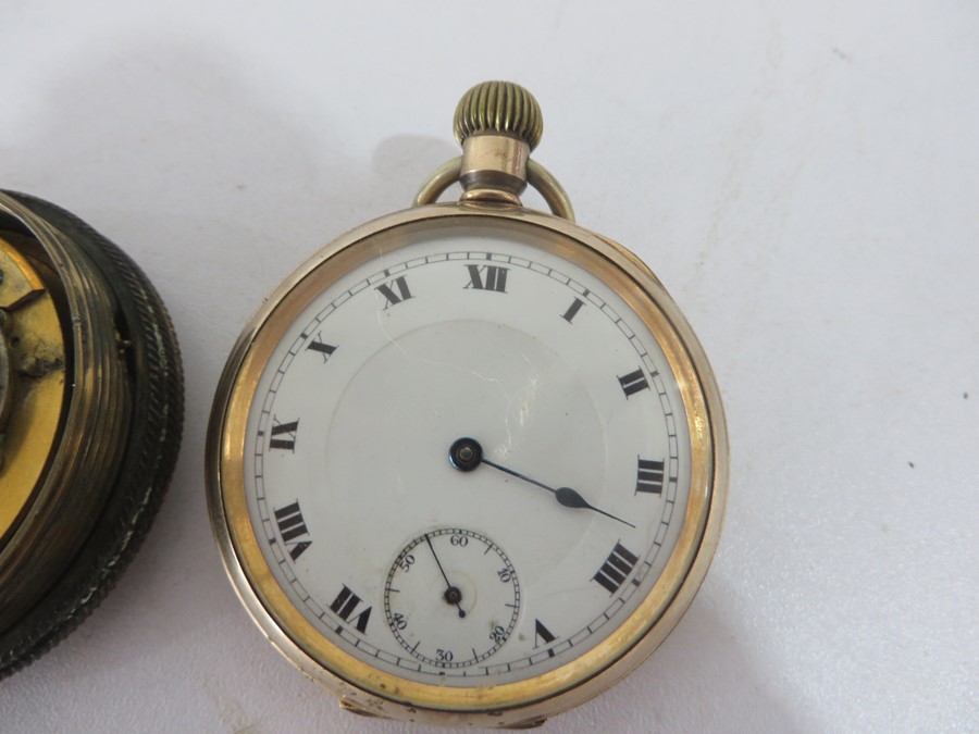 A gold filled Geneva Watch Case Co pocket watch along with a brass ...