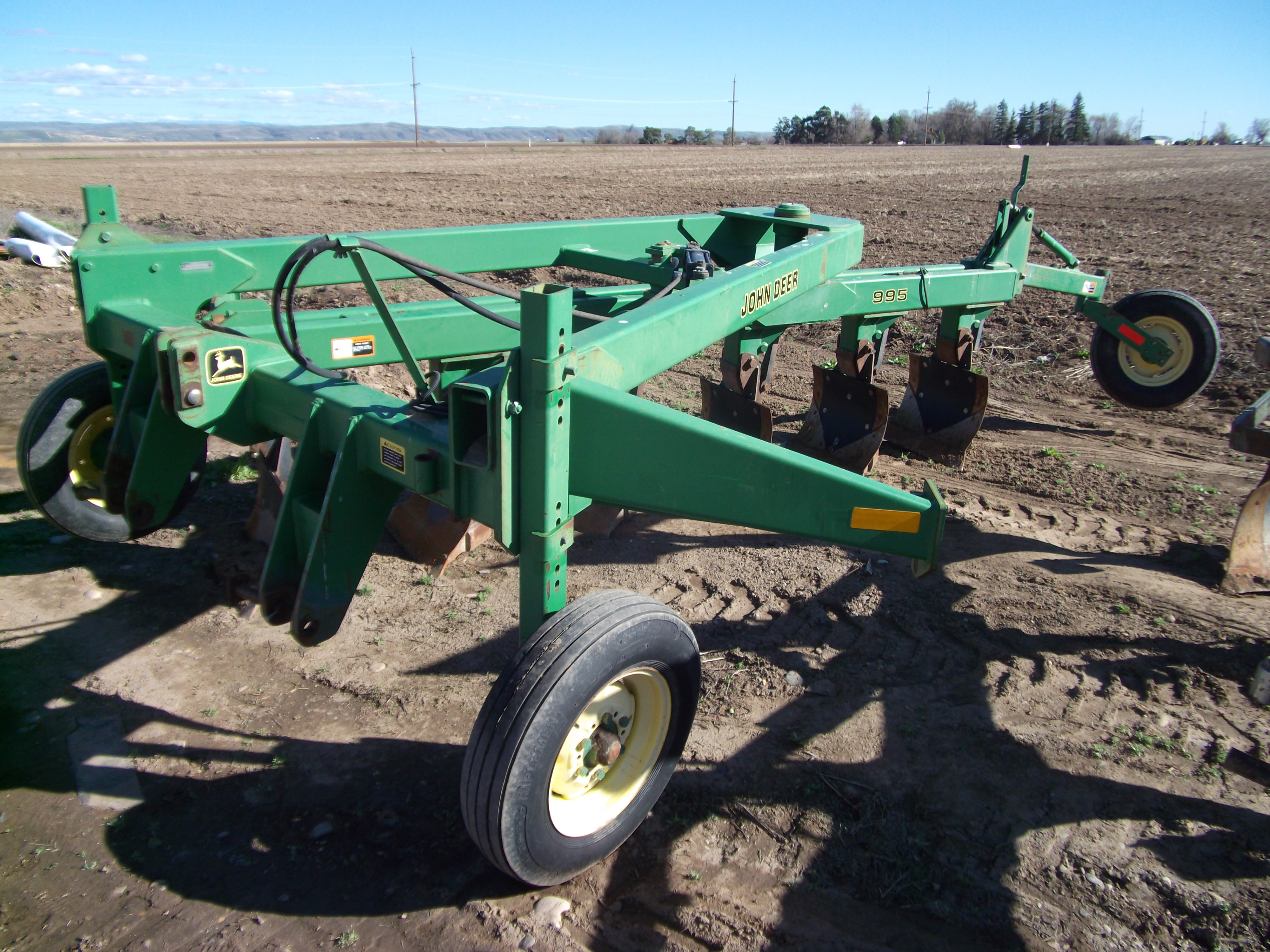 JD 995 switch plow 6 bottom on land