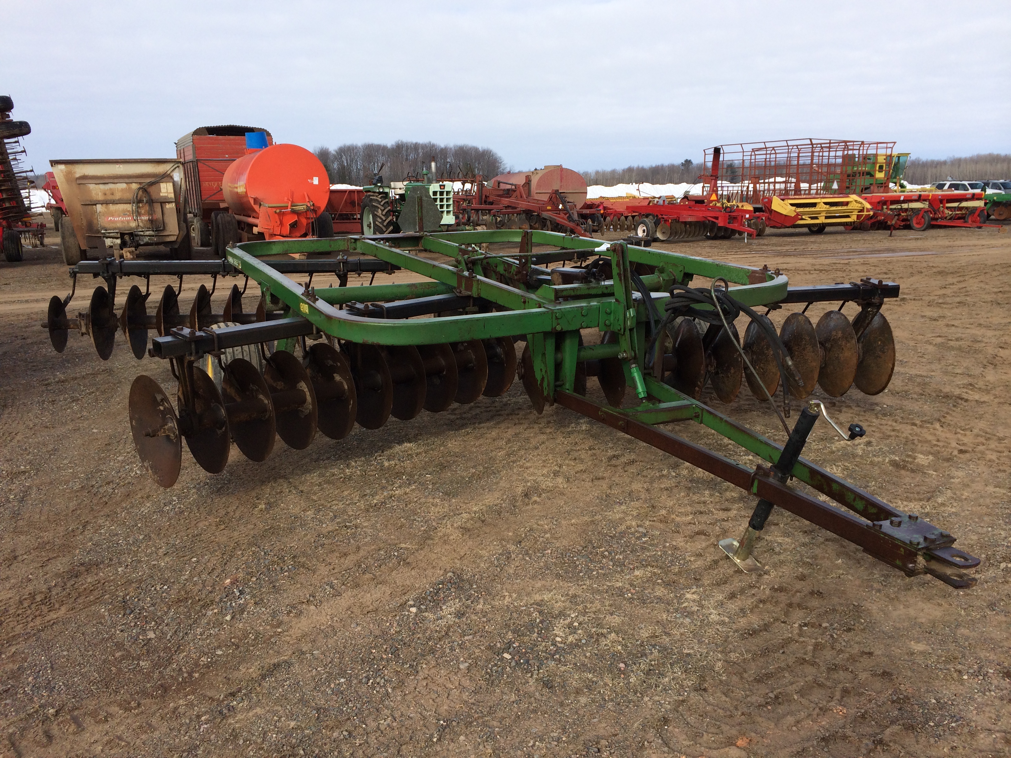 John Deere Model 210 Disk, 13 1/2 ft. 9" spacing, 21" blades, JD cylinder.