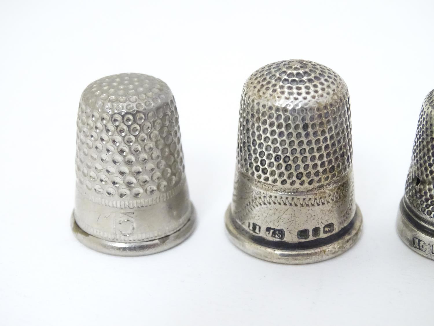 5 assorted thimbles including 2 hallmarked silver examples and a .830 ...
