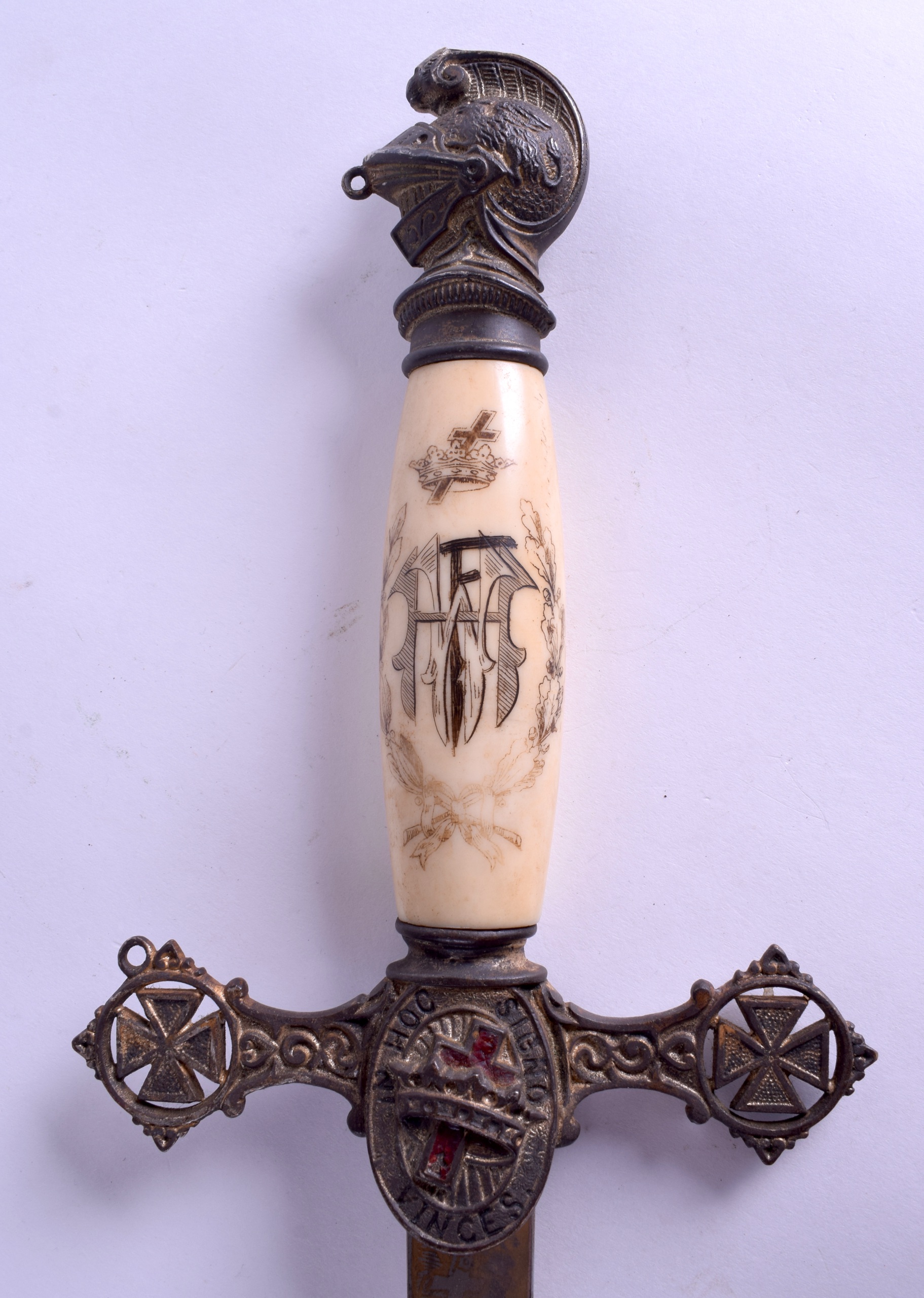 A 19TH CENTURY MASONIC CARVED IVORY HANDLED SWORD decorated with a ...