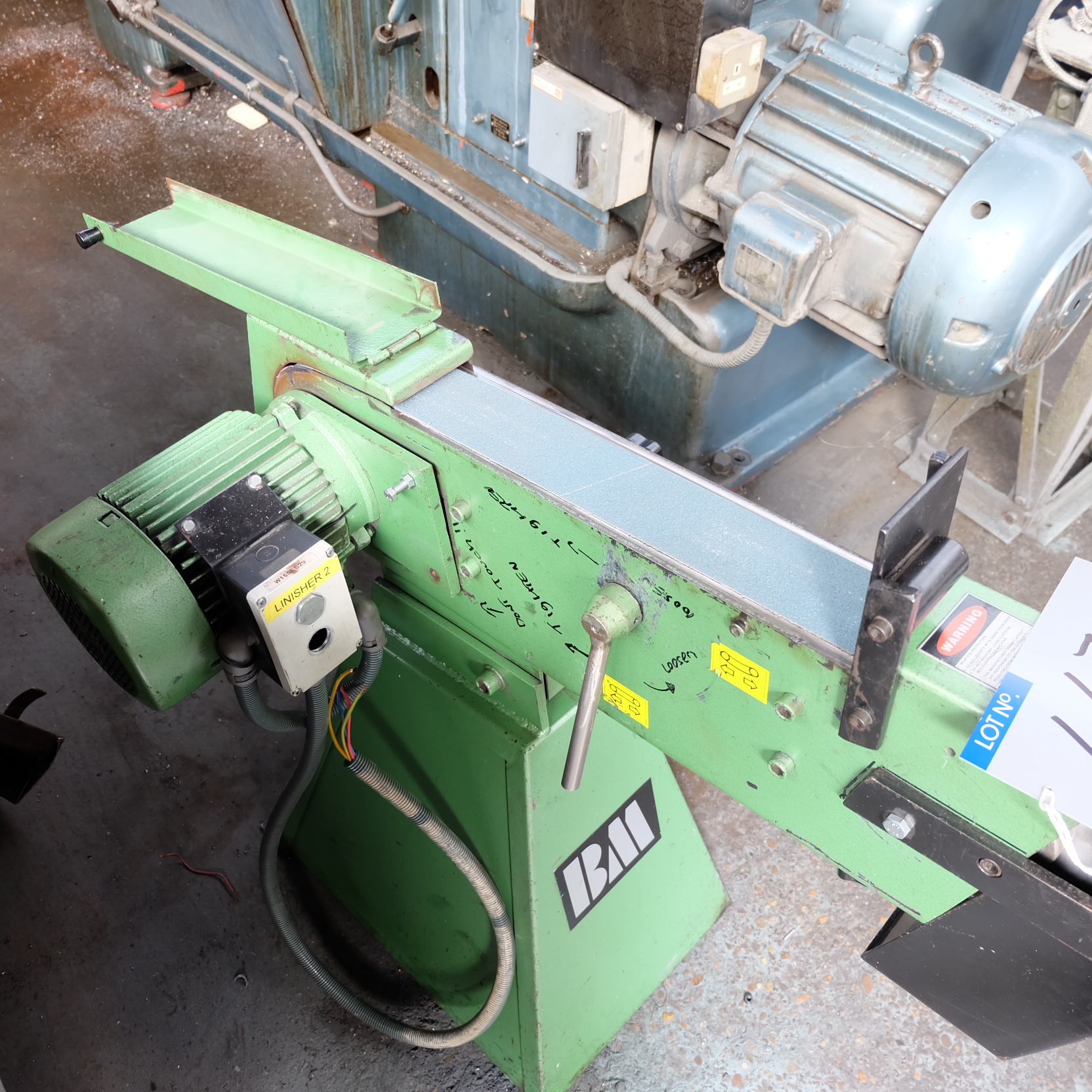 A BM Pedstal Mounted Linishing Machine No.332231: 3in w x 17in horizontal.