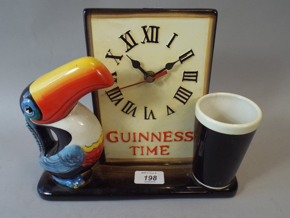A Reproduction Guinness Toucan Clock, Guinness Time.