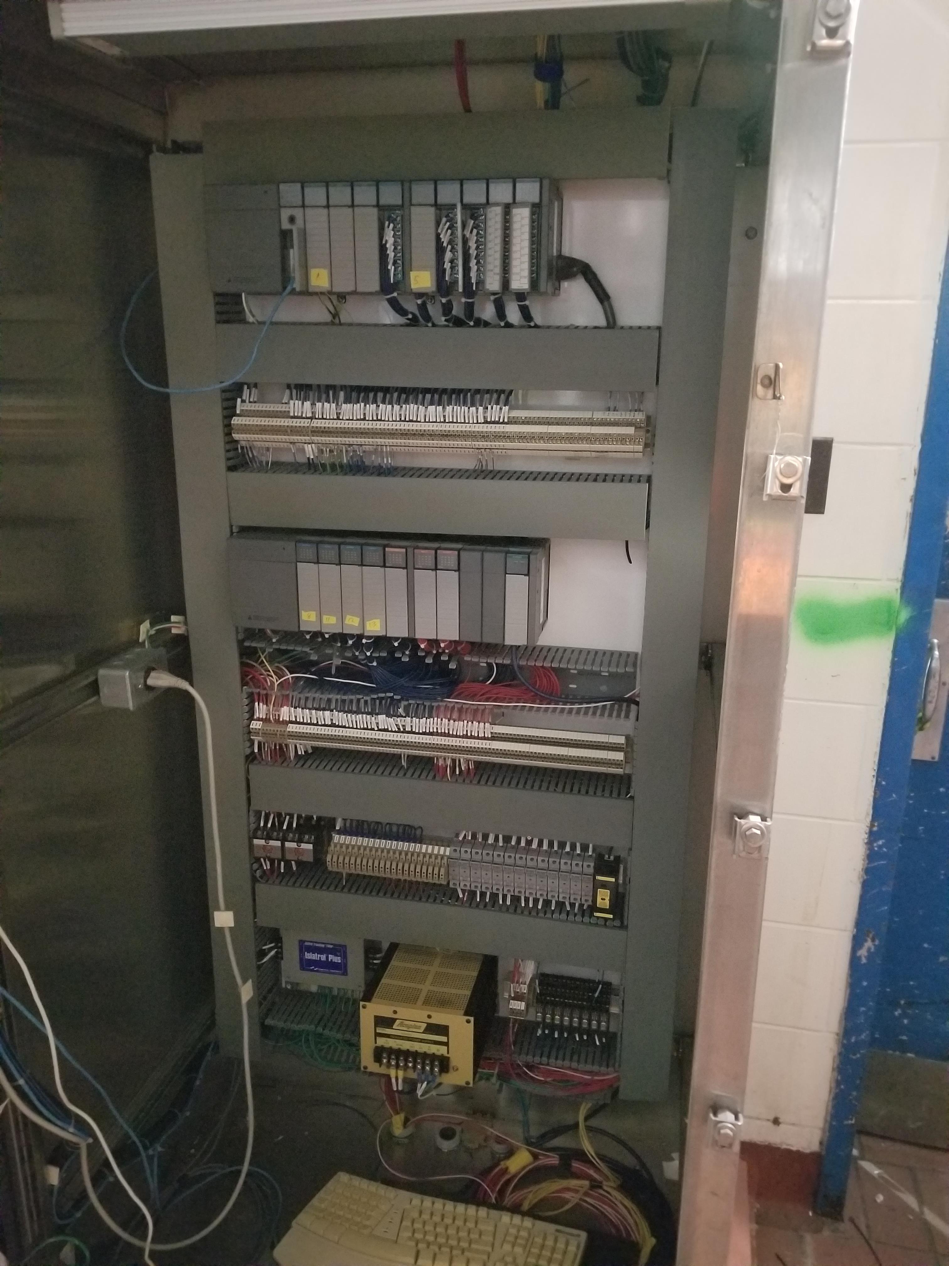 Control Cabinet with (2) Allen Bradley SLC 5/01 PLC's, 9-Slot Chassis ...