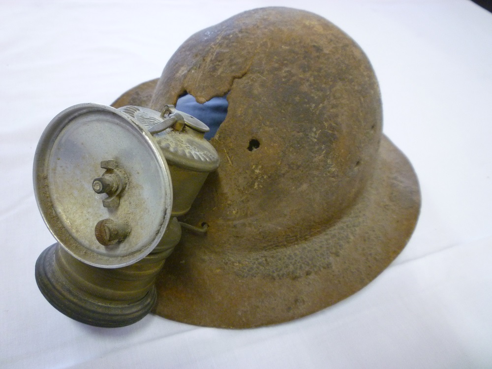 A 19th century Cornish miners harden felt mining hat with wide brim and ...