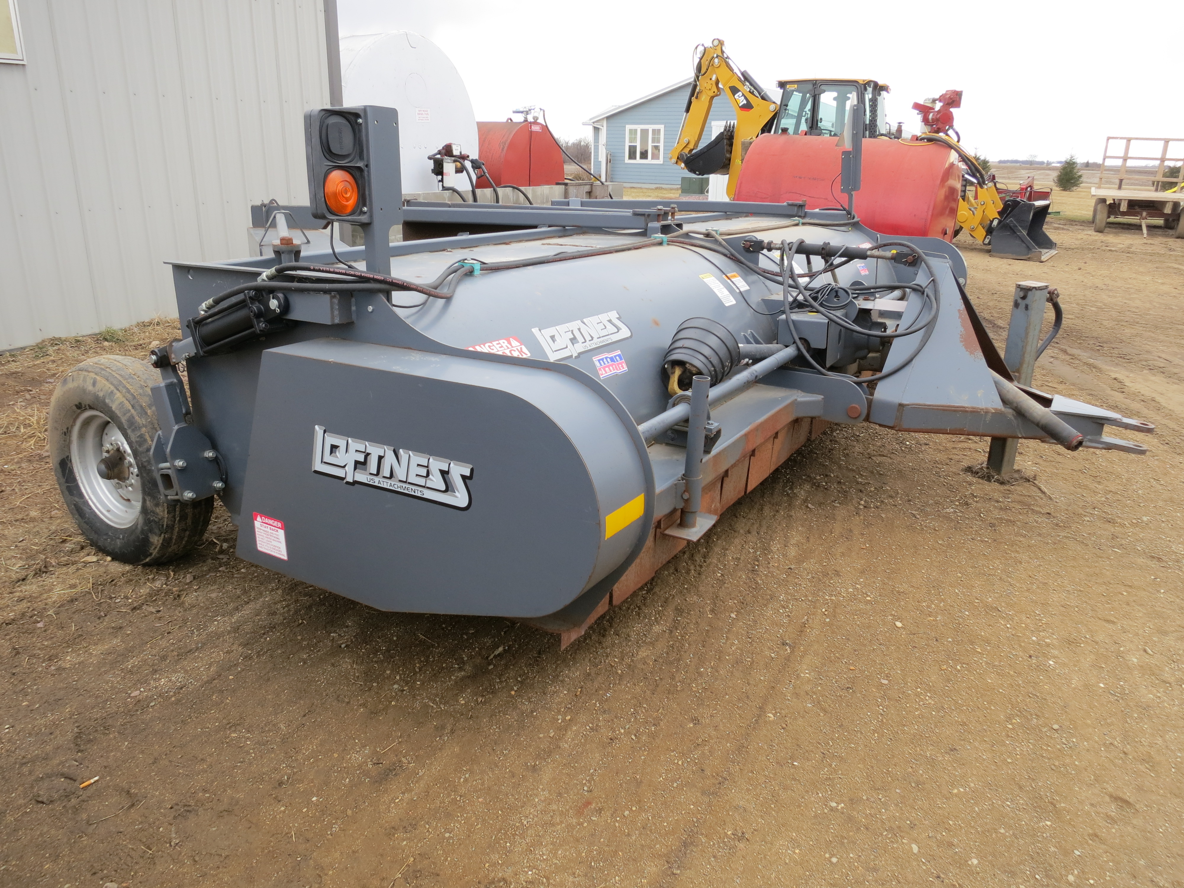 Loftness 15’ 180 flail shredder with windrower (model 180W44P23)