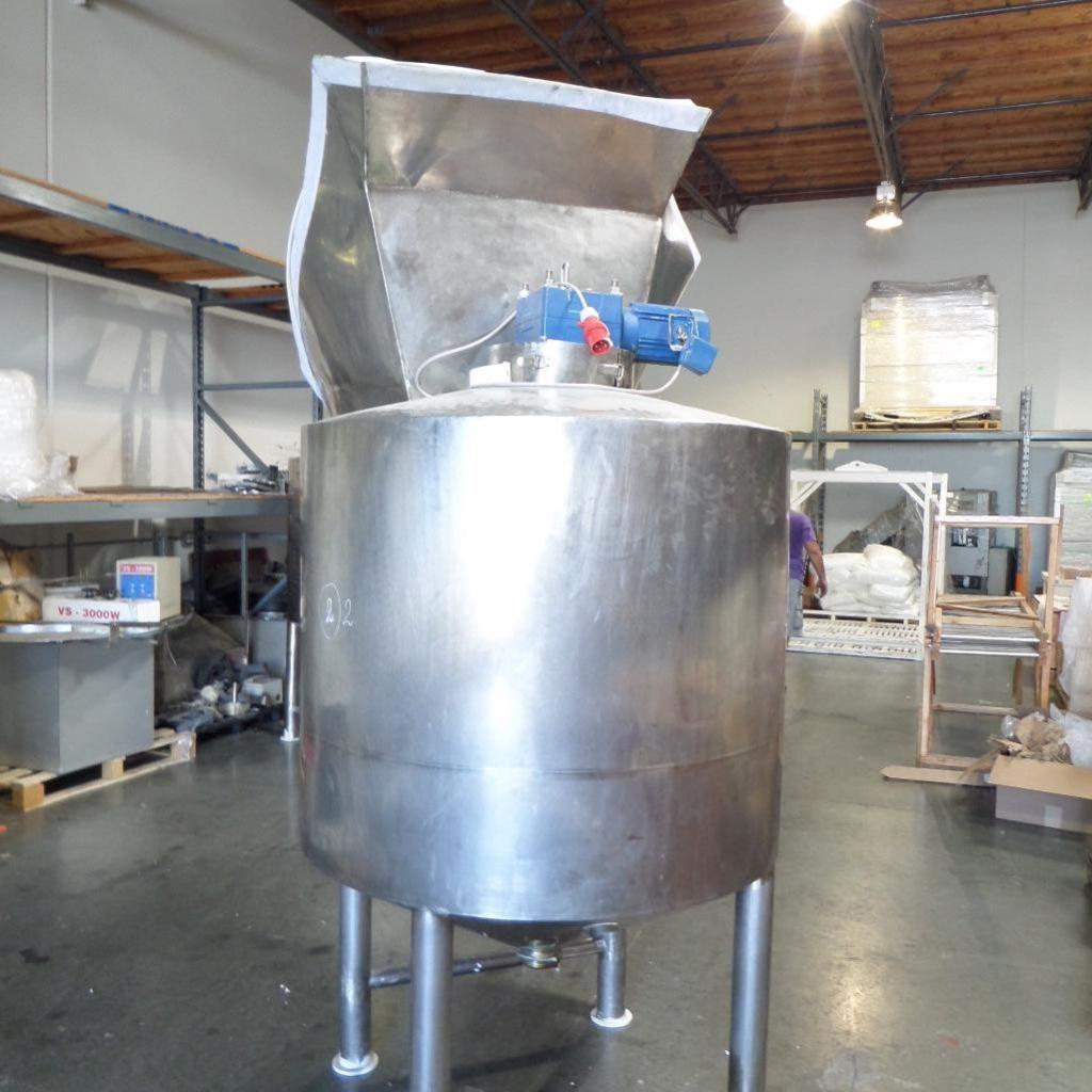 1- Used SS Silo with agitator for powders Skidding and Load out charges ...