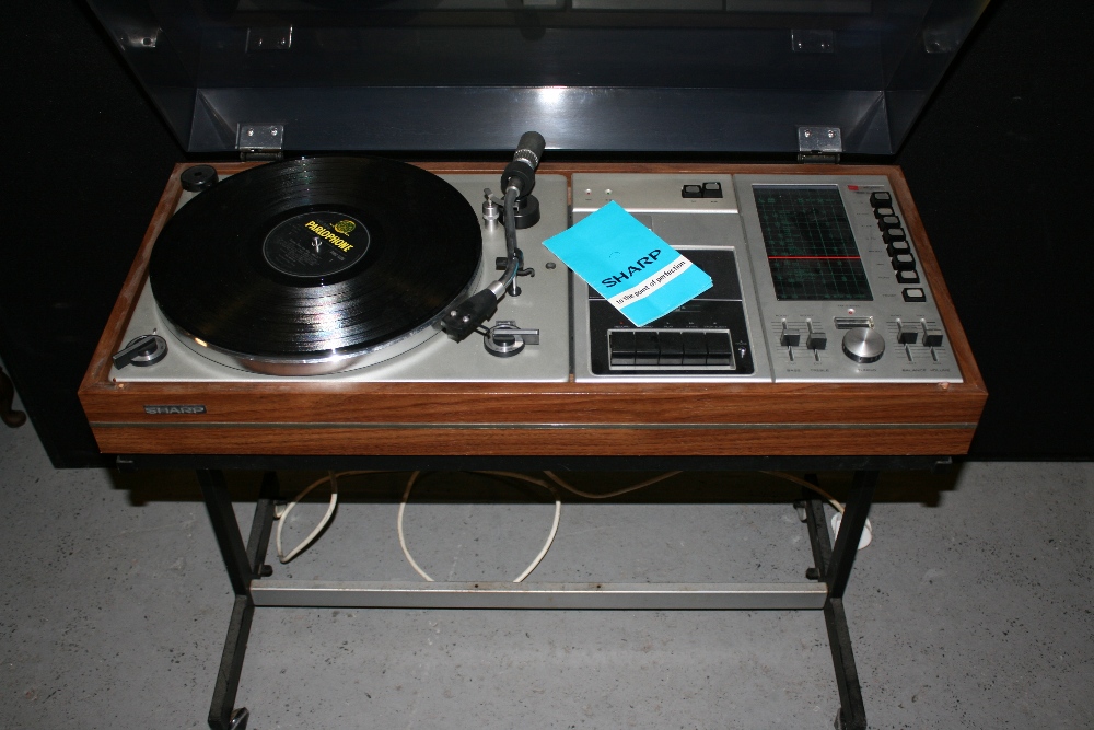 SHARP - the Sharp stereo music system model SG-309H. Comes with wheeled ...