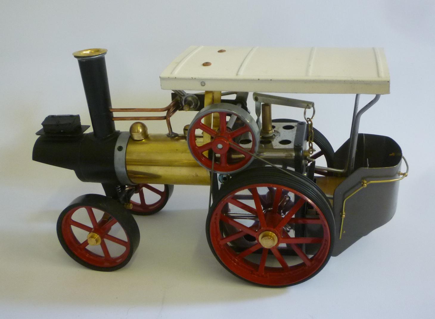 A Mamod Traction Engine with engineered modifications including canopy ...
