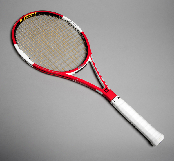 A Roger Federer match-used tennis racquet 2006, a red & white Wilson ...