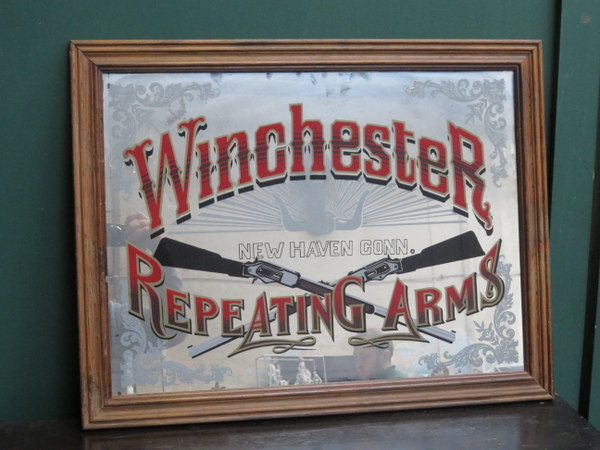 WINCHESTER REPEATING ARMS ADVERTISING MIRROR, APPROXIMATELY 44cm x 59cm