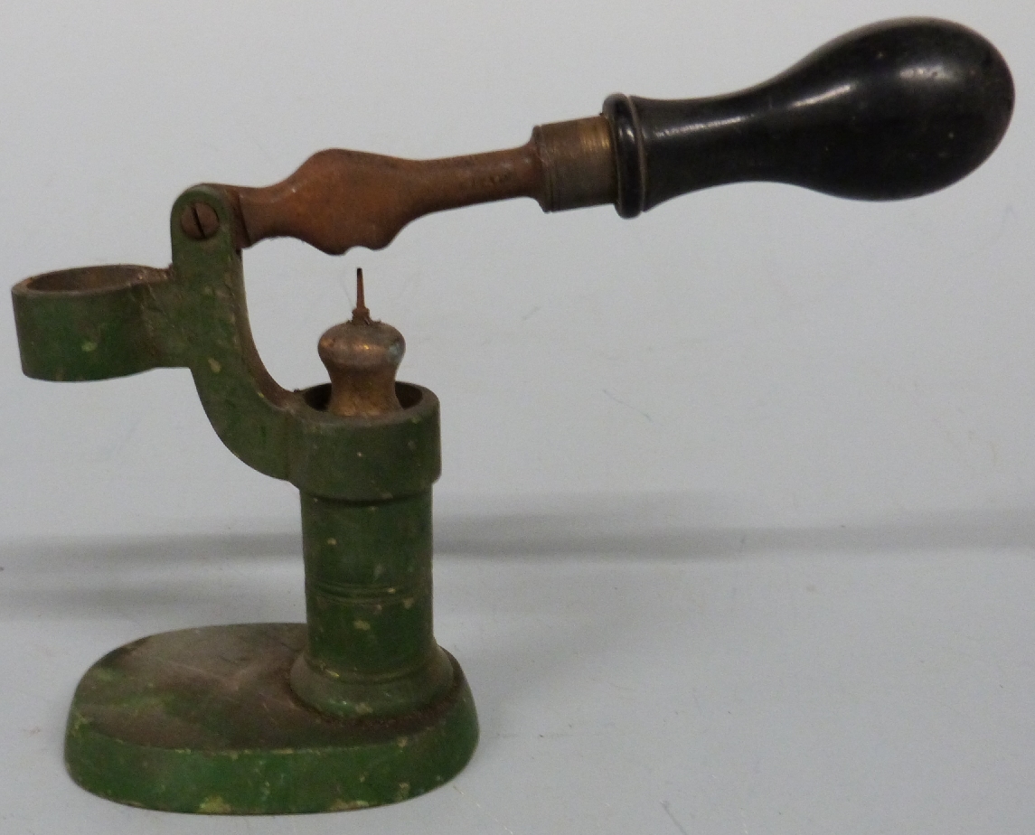 Three shotgun cartridge reloading tools including a capper/decapper