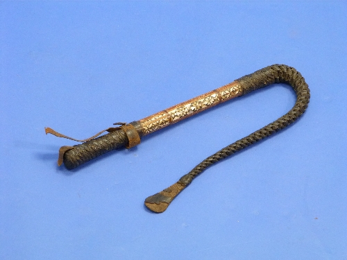 An Early 20thC North African Camel Whip, with plaited leather handle ...