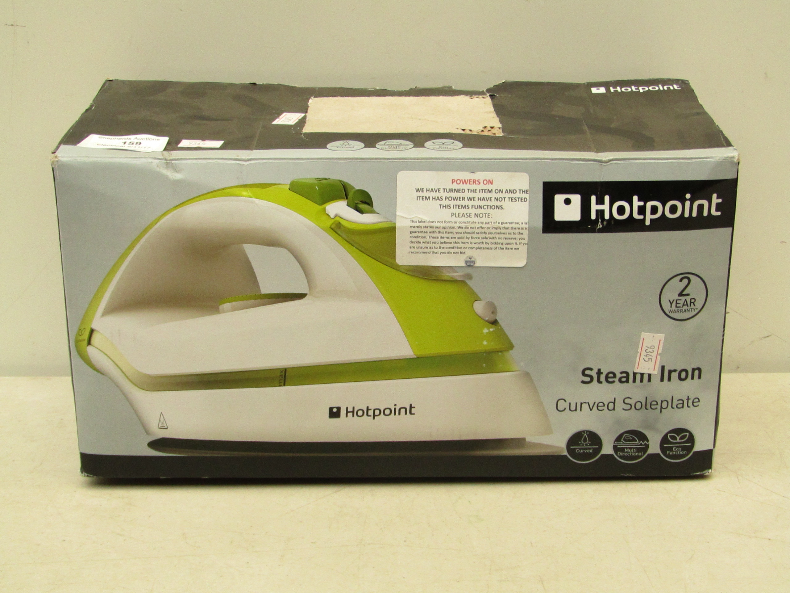 Hotpoint steam iron with a curved soleplate. Powers on & boxed.