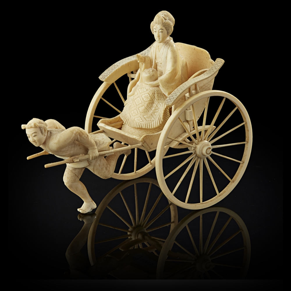 CARVED IVORY 'RICKSHAW' GROUP MEIJI PERIOD depicting a wealthy lady ...
