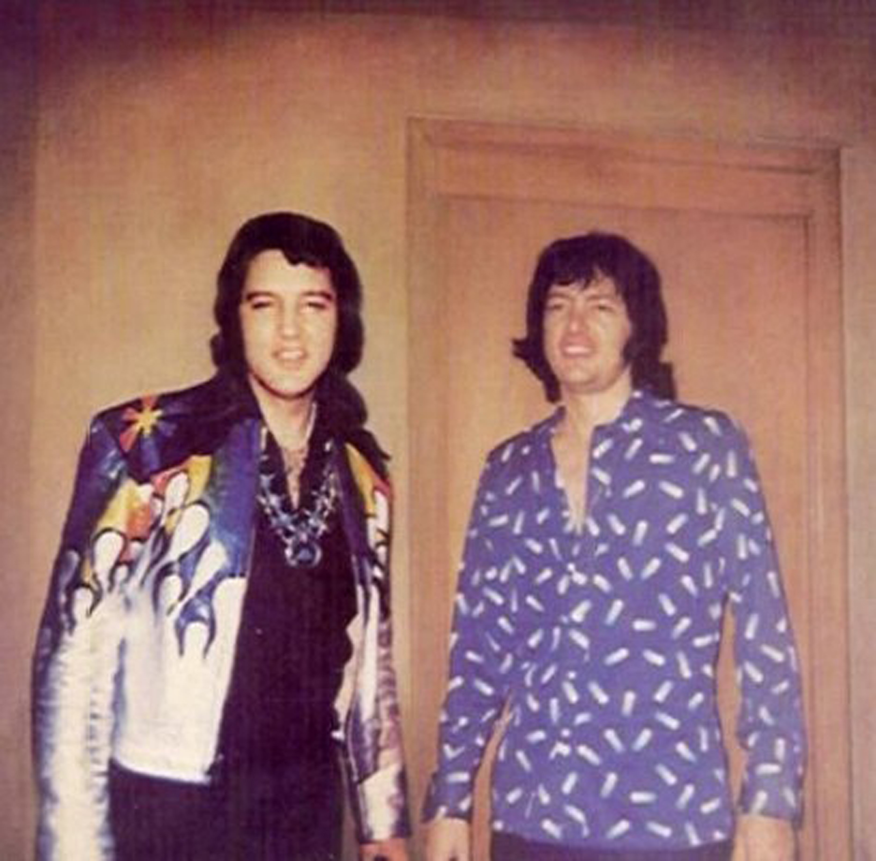 An Elvis Presley silver leather jacket painted with multicolor flame ...