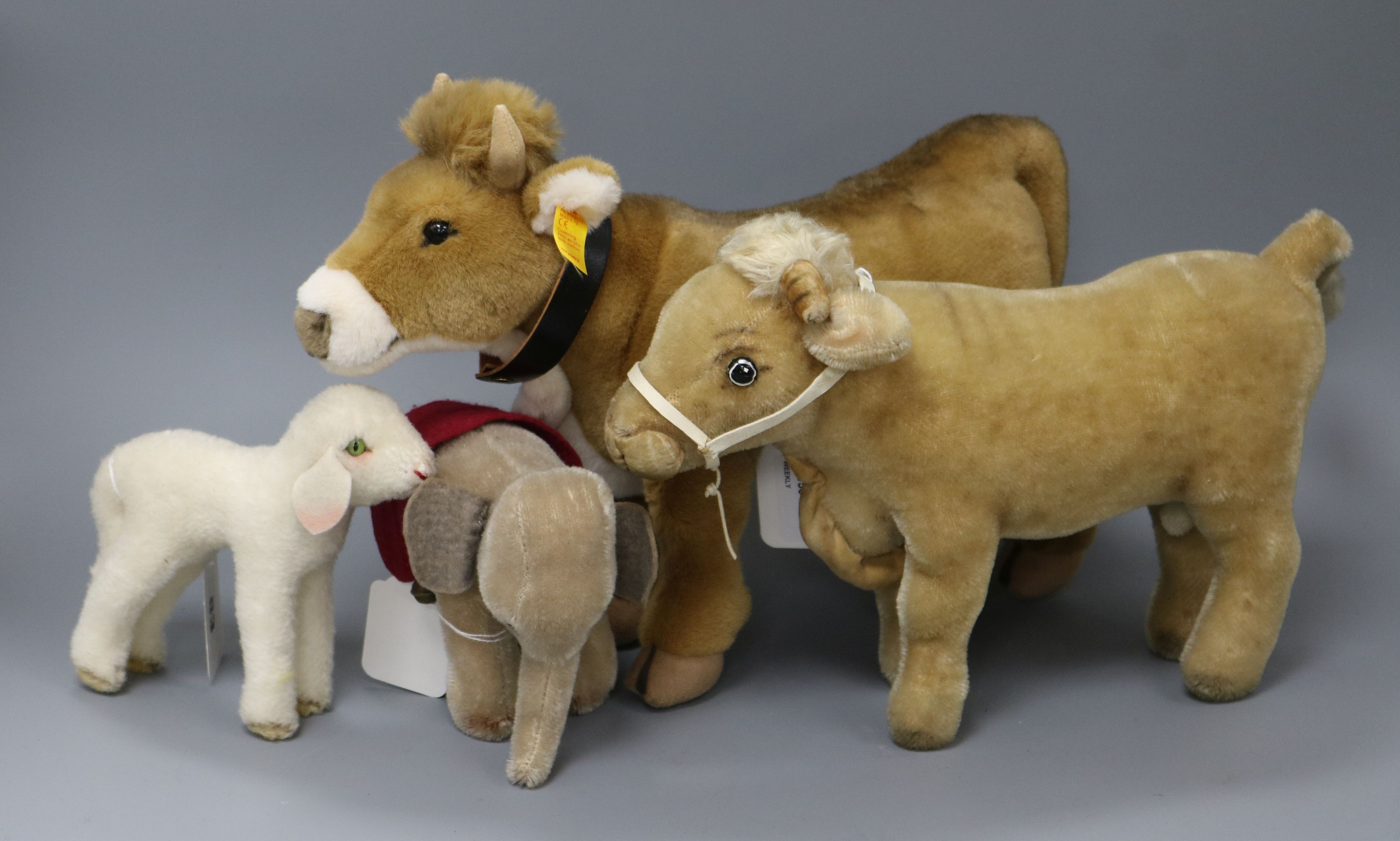 A Steiff cow with bell, 'Bertha', no. 072963, button in ear and three ...