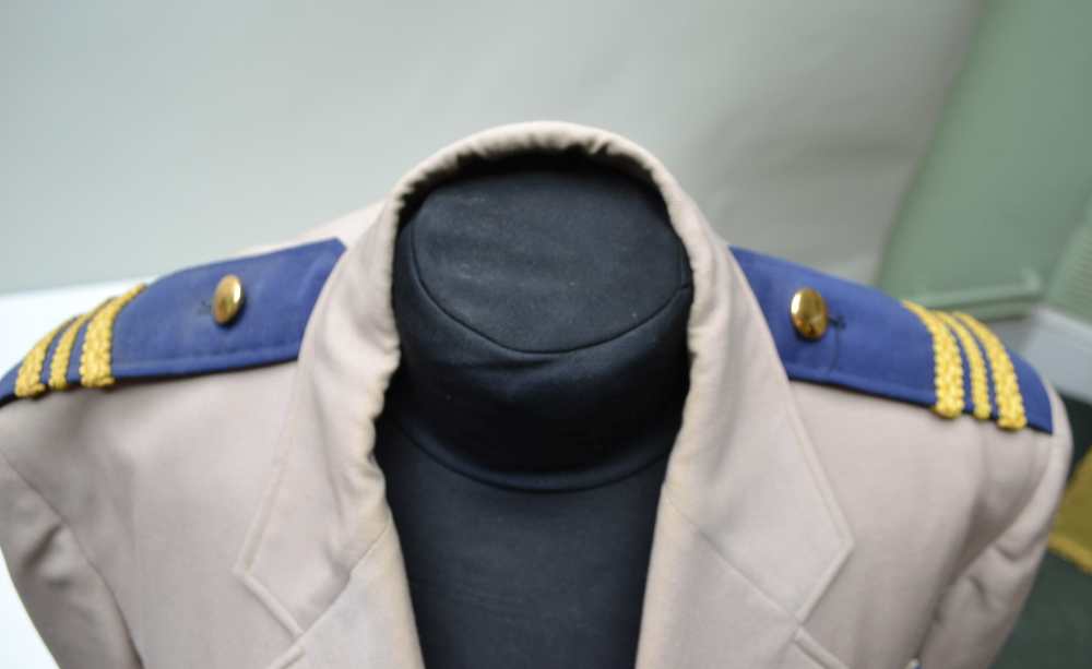 A LUFTHANSA PILOT'S UNIFORM including; a jacket with, selection of ...