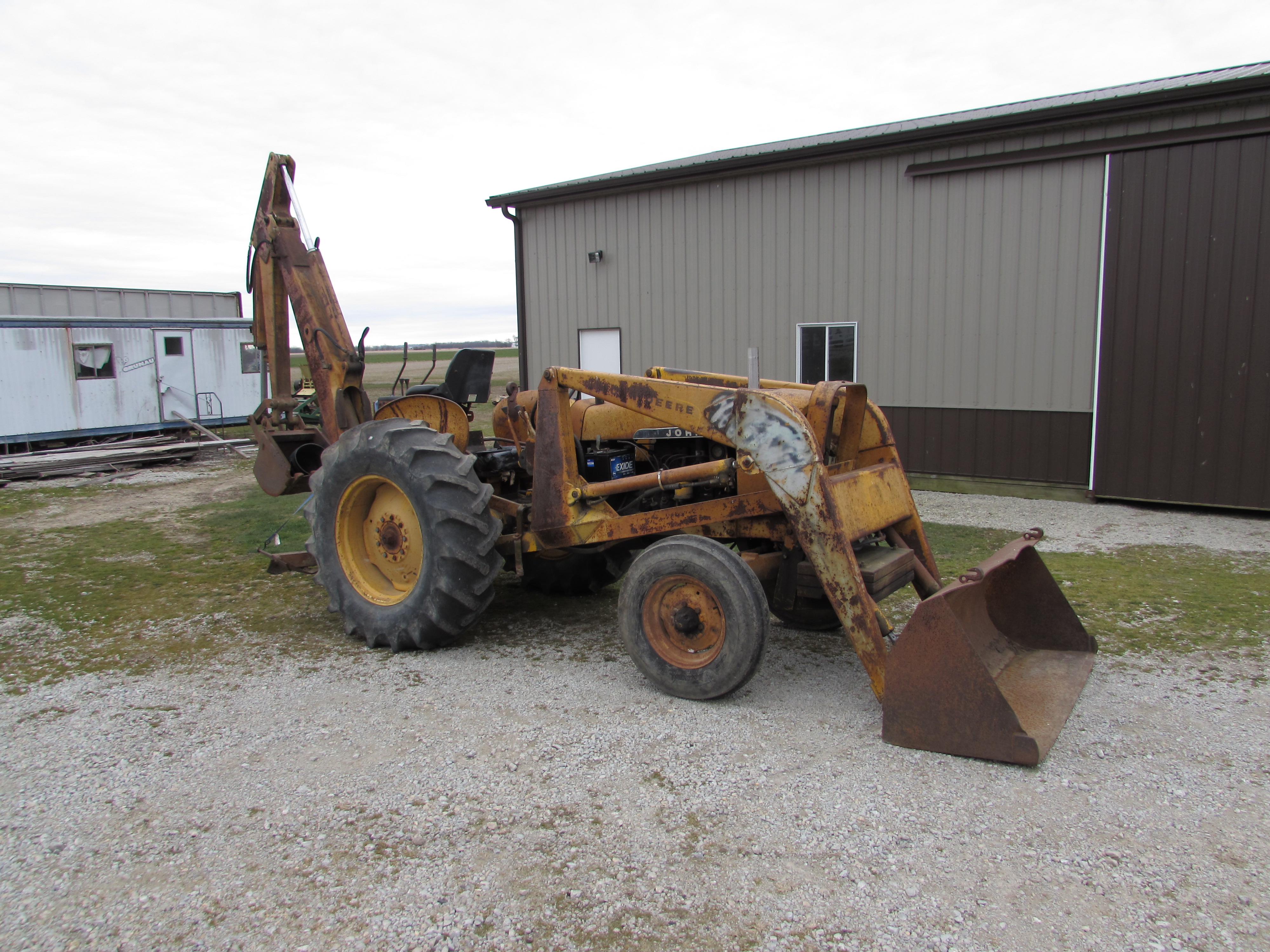 John Deere 1010 backhoe/loader tractor, 4 cyl. Gas, 20” trench bucket ...